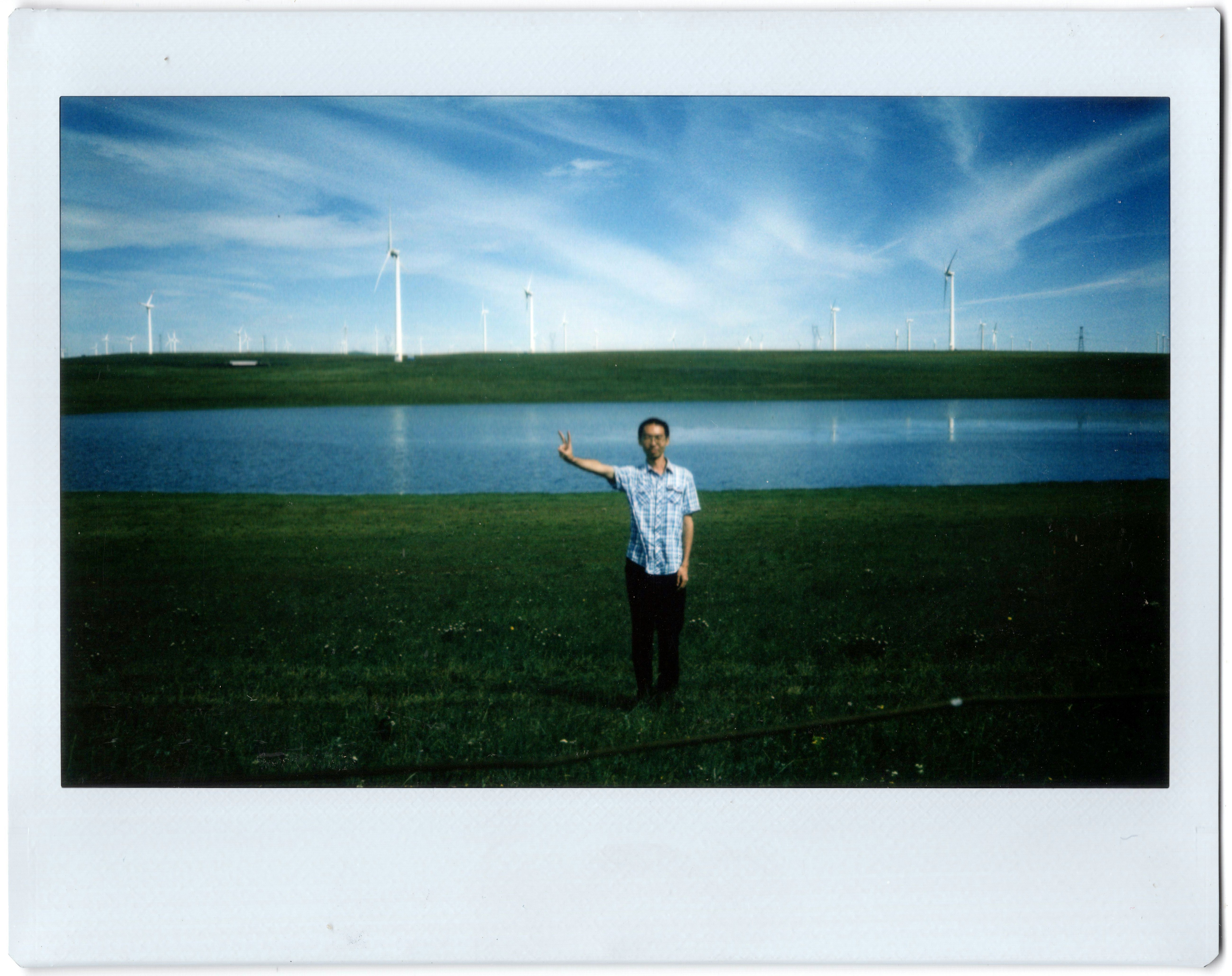 Wave of Windmills: A Quiet Portrait by the River