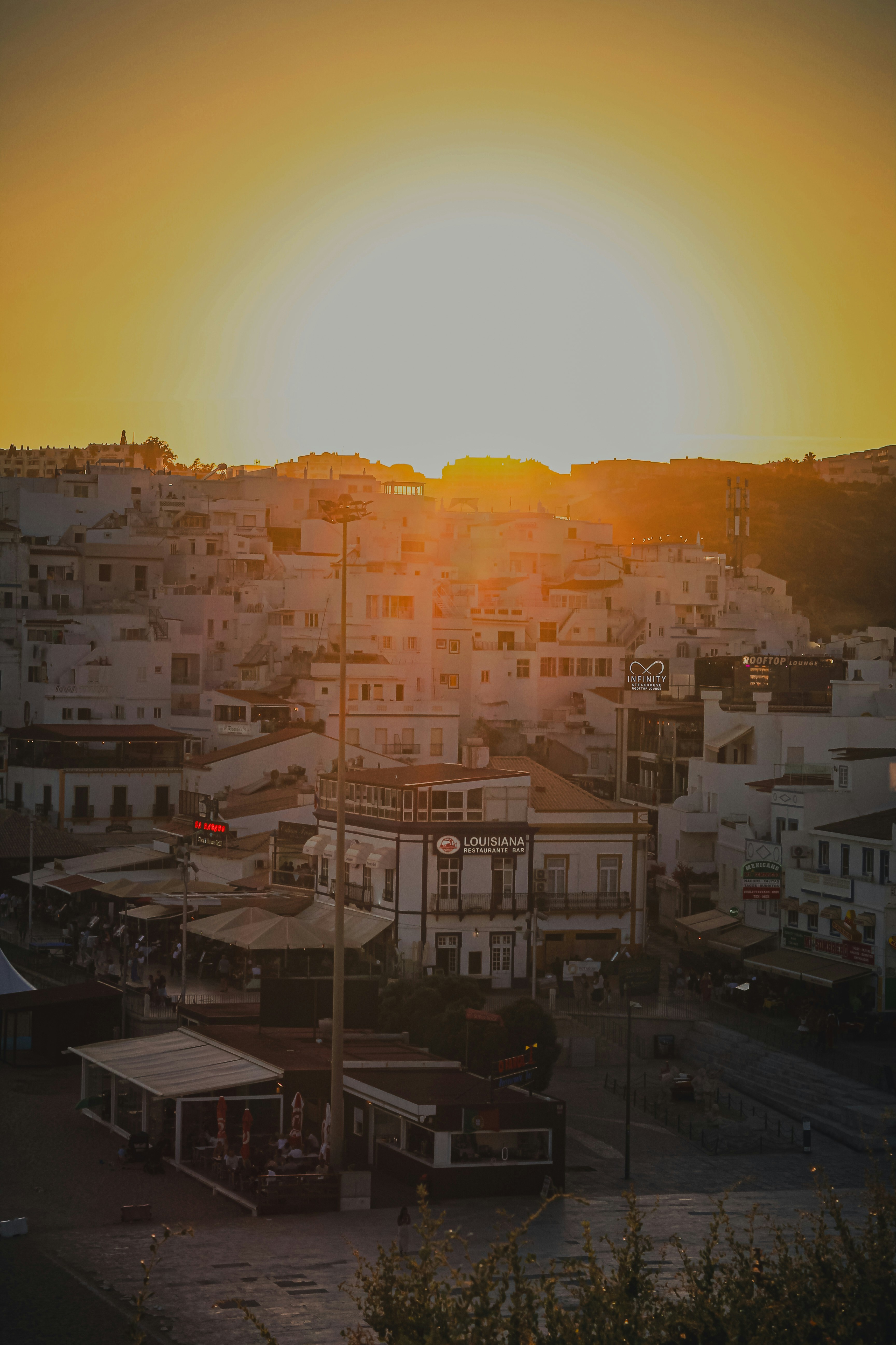 Horizon Ablaze: Sunset Over a Quiet Urban Basin