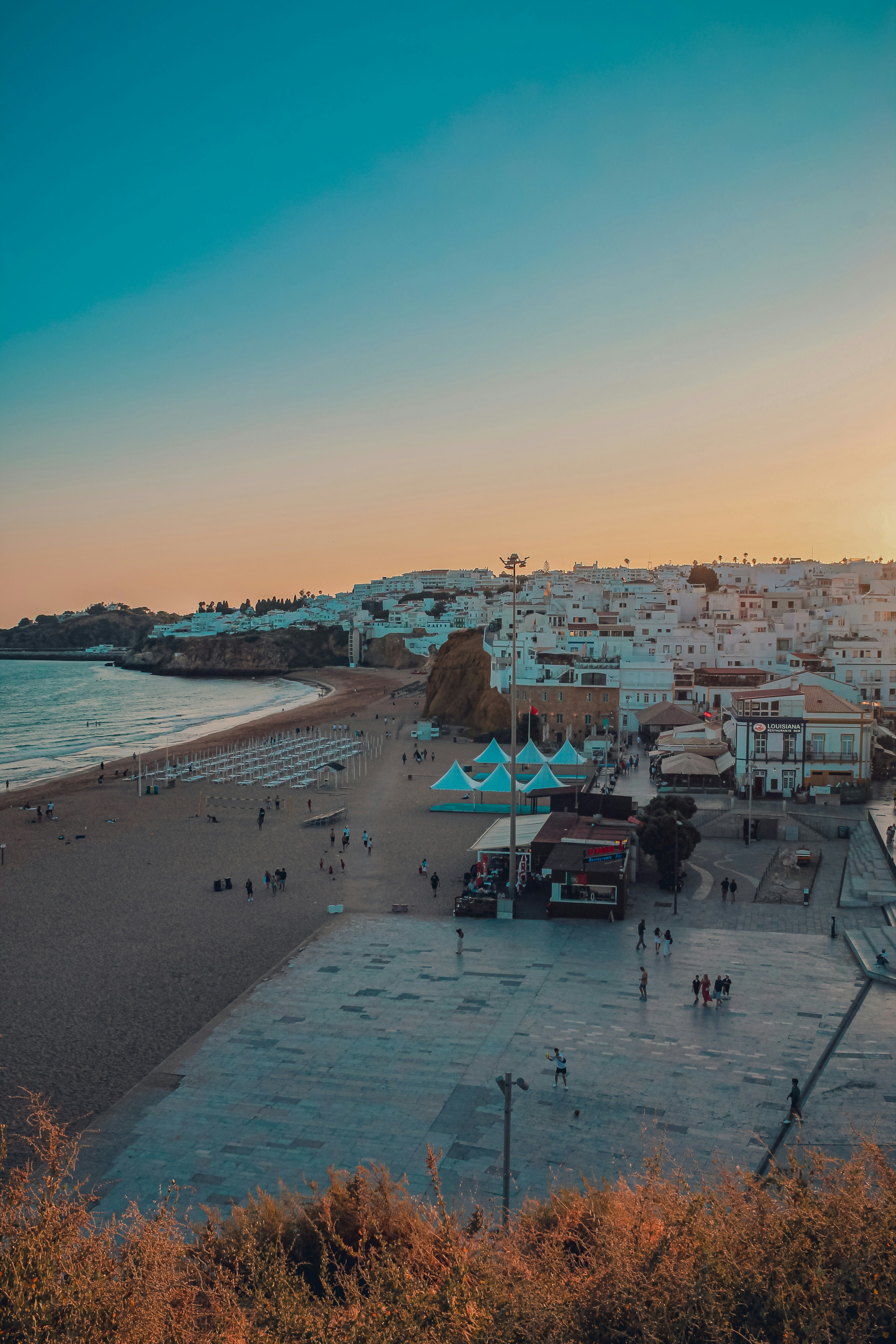 Sunset Over the Cove: A Quiet Seaside Village Unfolds