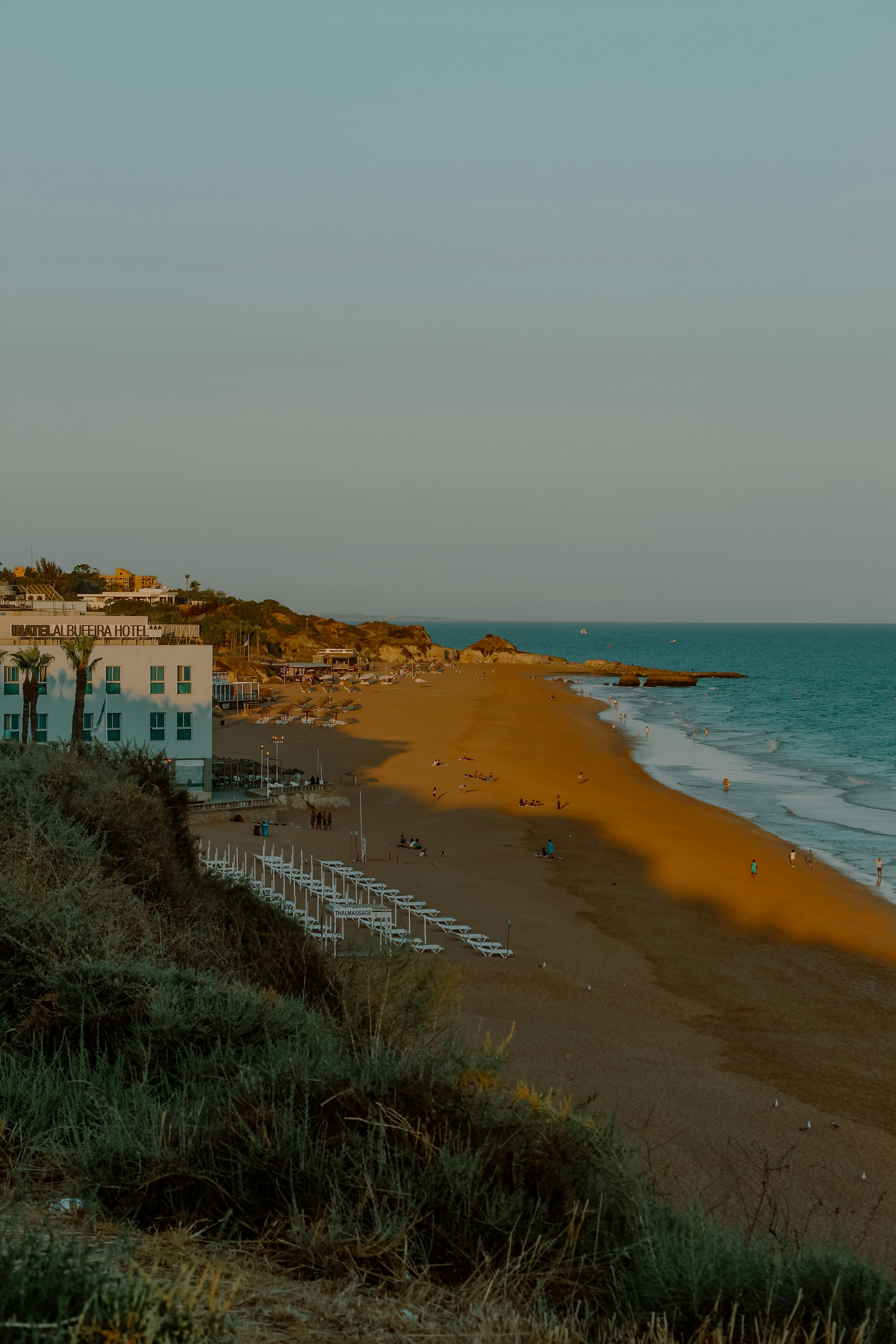 Deserted Shoreline: A Quiet Beach Meet of Sand and Sea