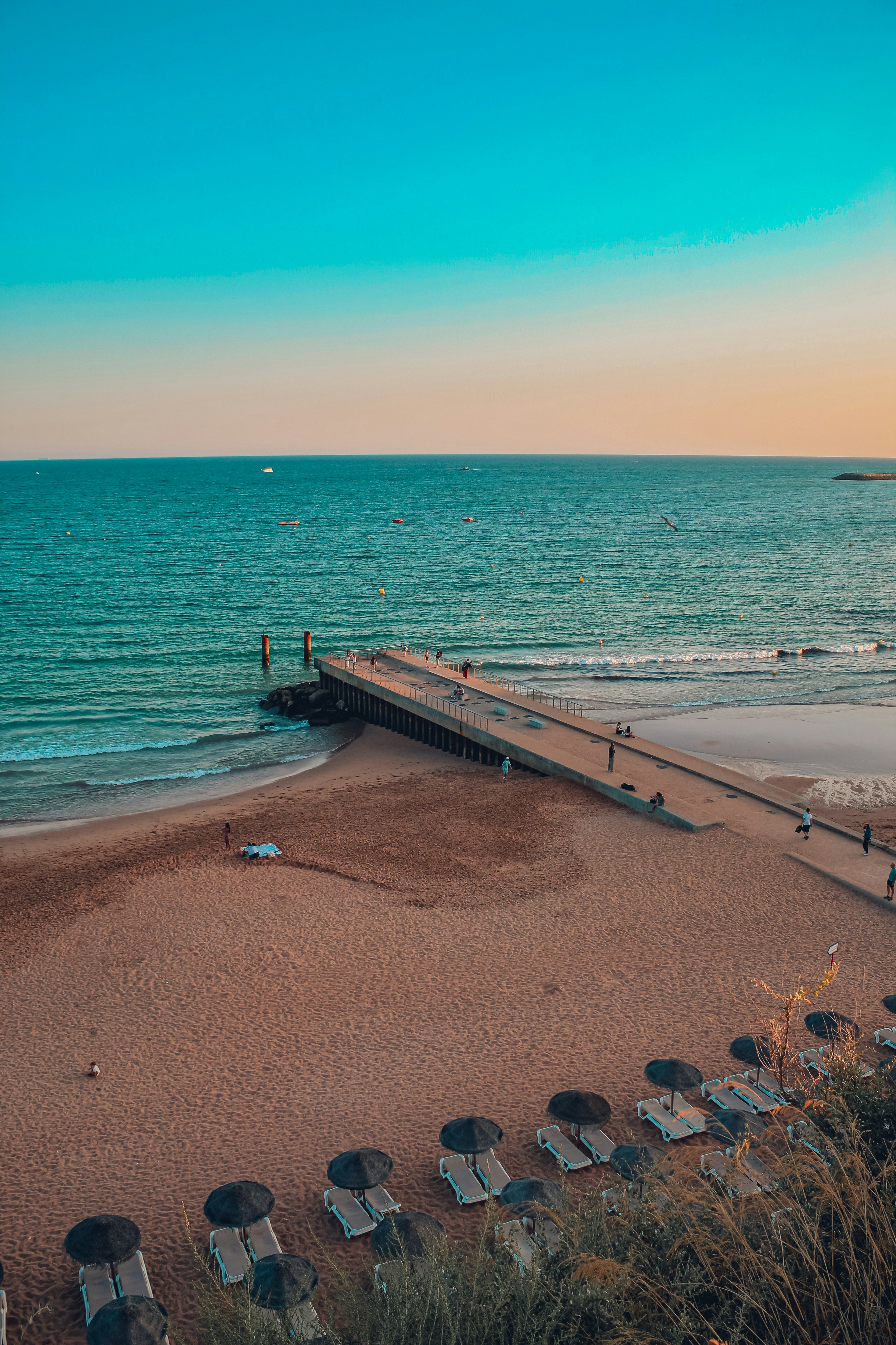 Pier Cutting the Atlantic Twilight