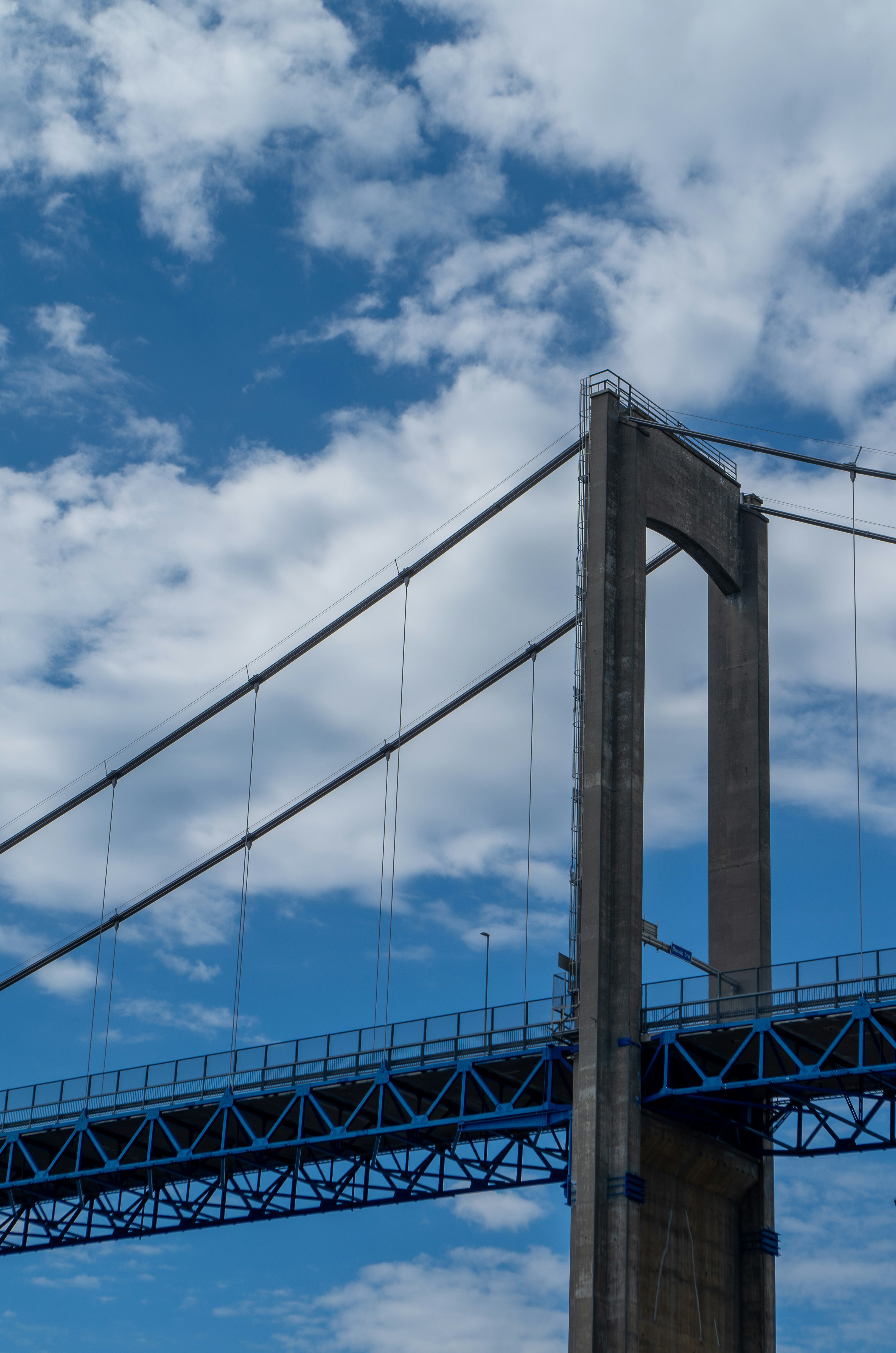 Blue Cables and Concrete Arches: A Sky-Pitched Suspension