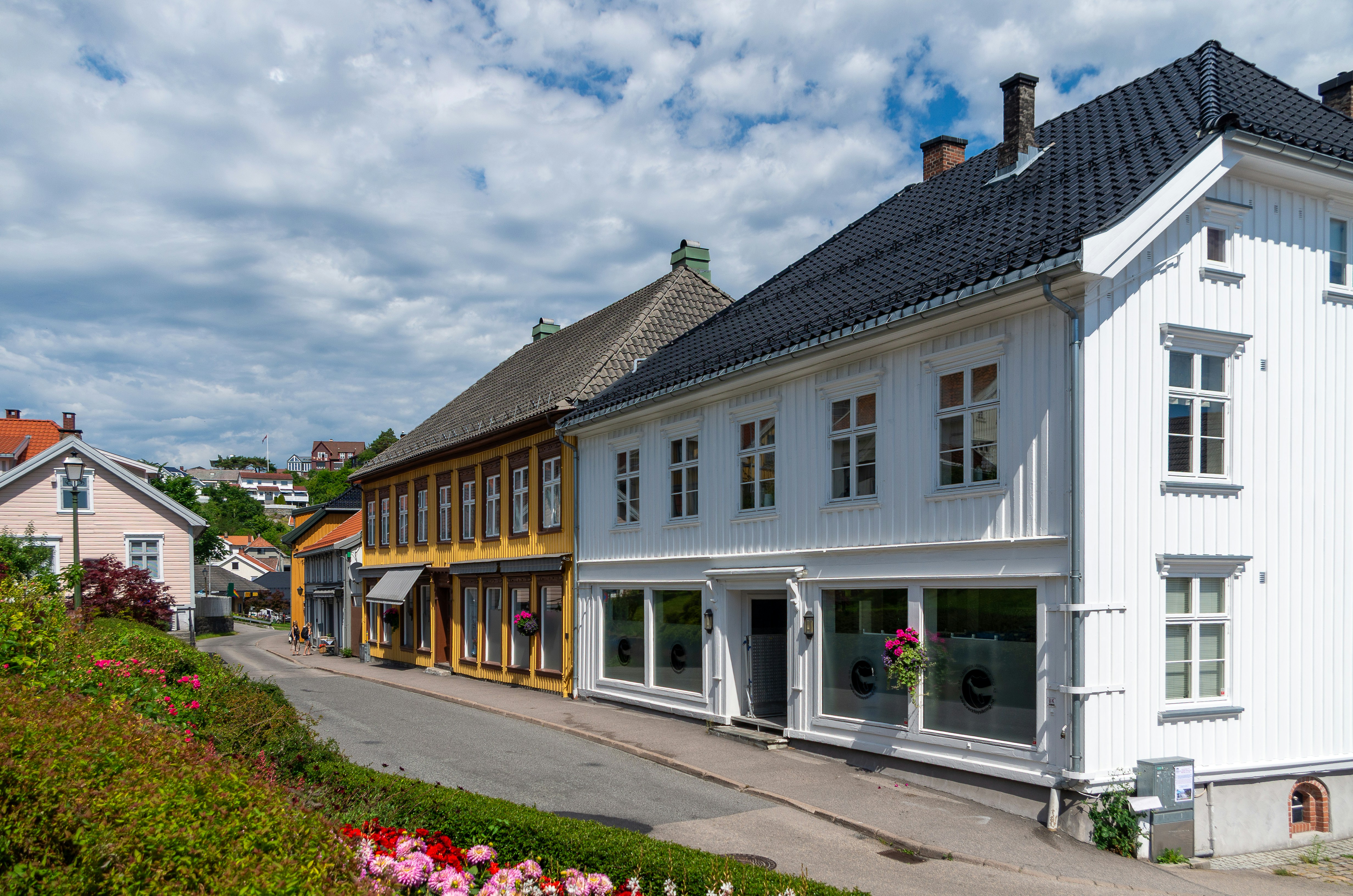 White-fronted Boutique on a Quiet Norwegian Street