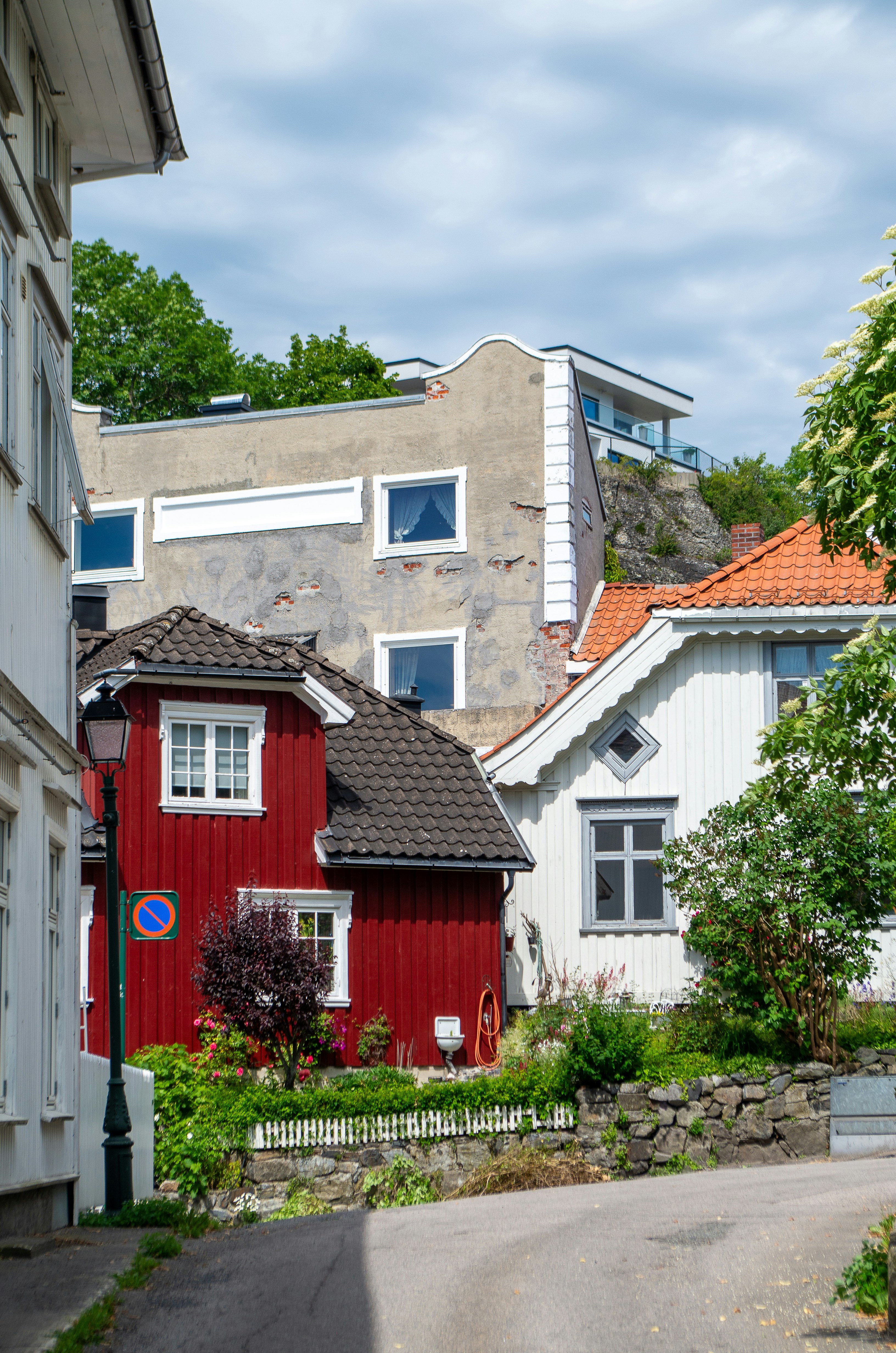 Colorful Norwegian Street: Red House, White Siding and Quiet Lane