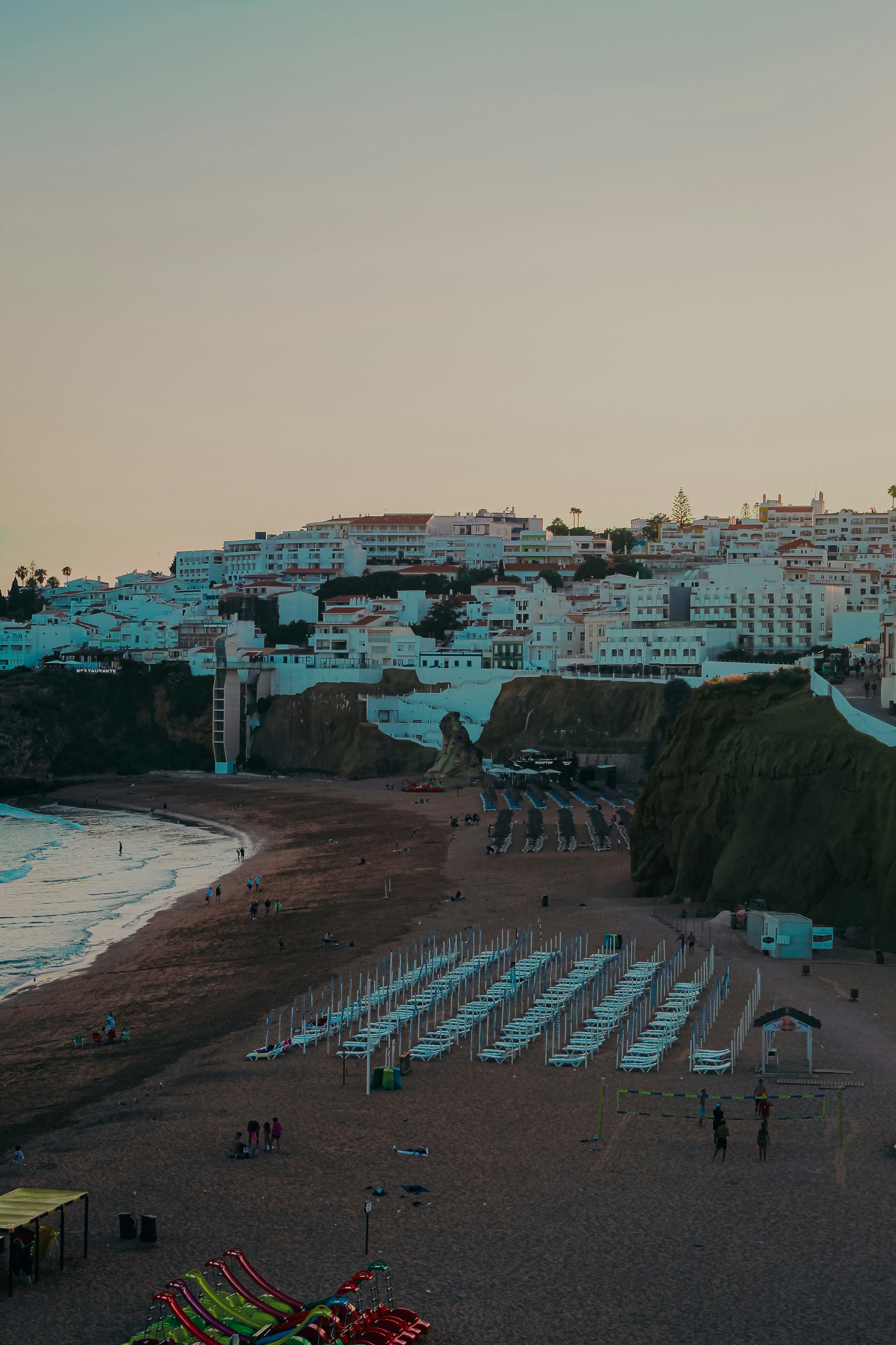 Coastal Village Terrace: Sunlit Steps and Seaside Rows