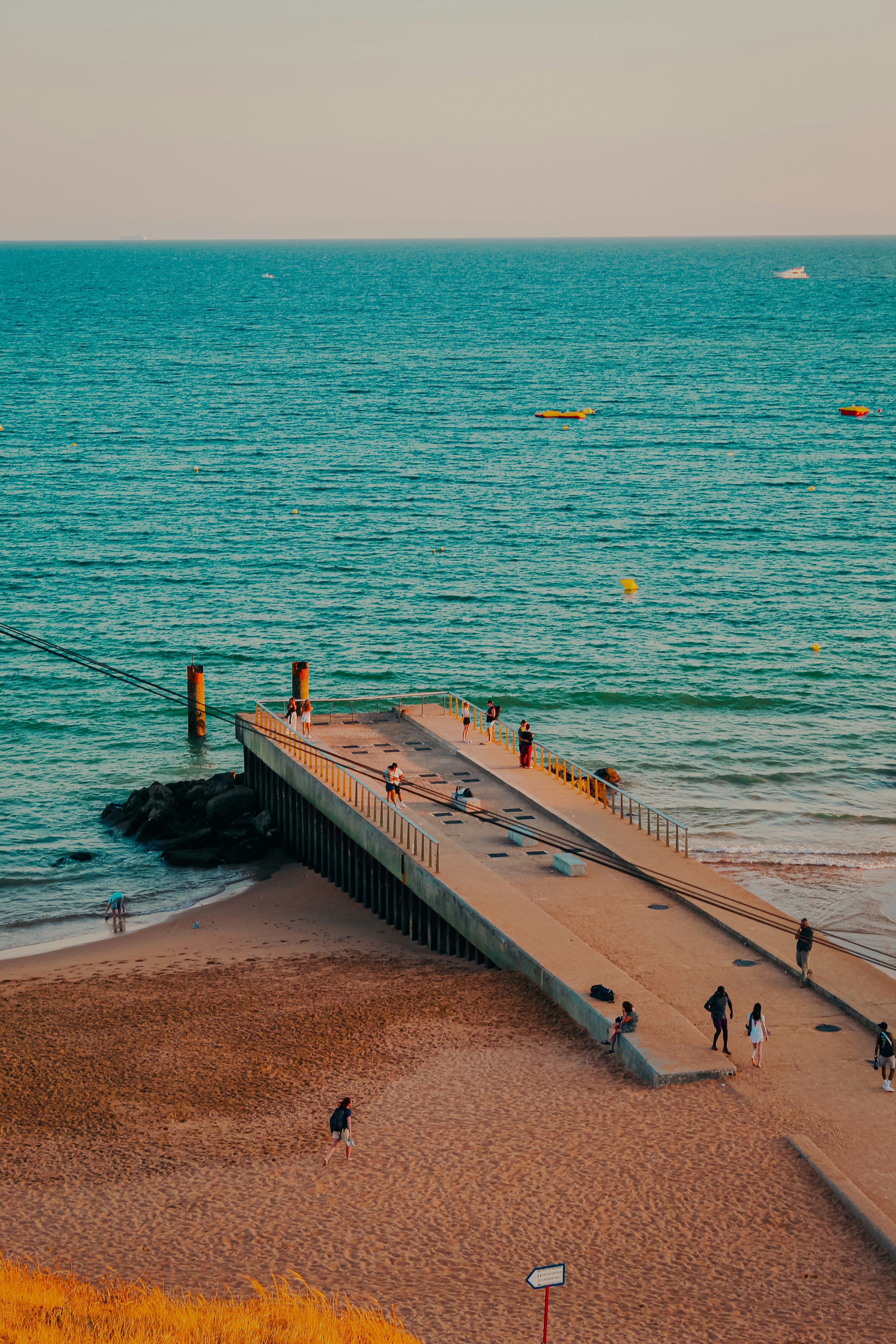 Jetty Framing the Sea: A Golden Shoreline Walk