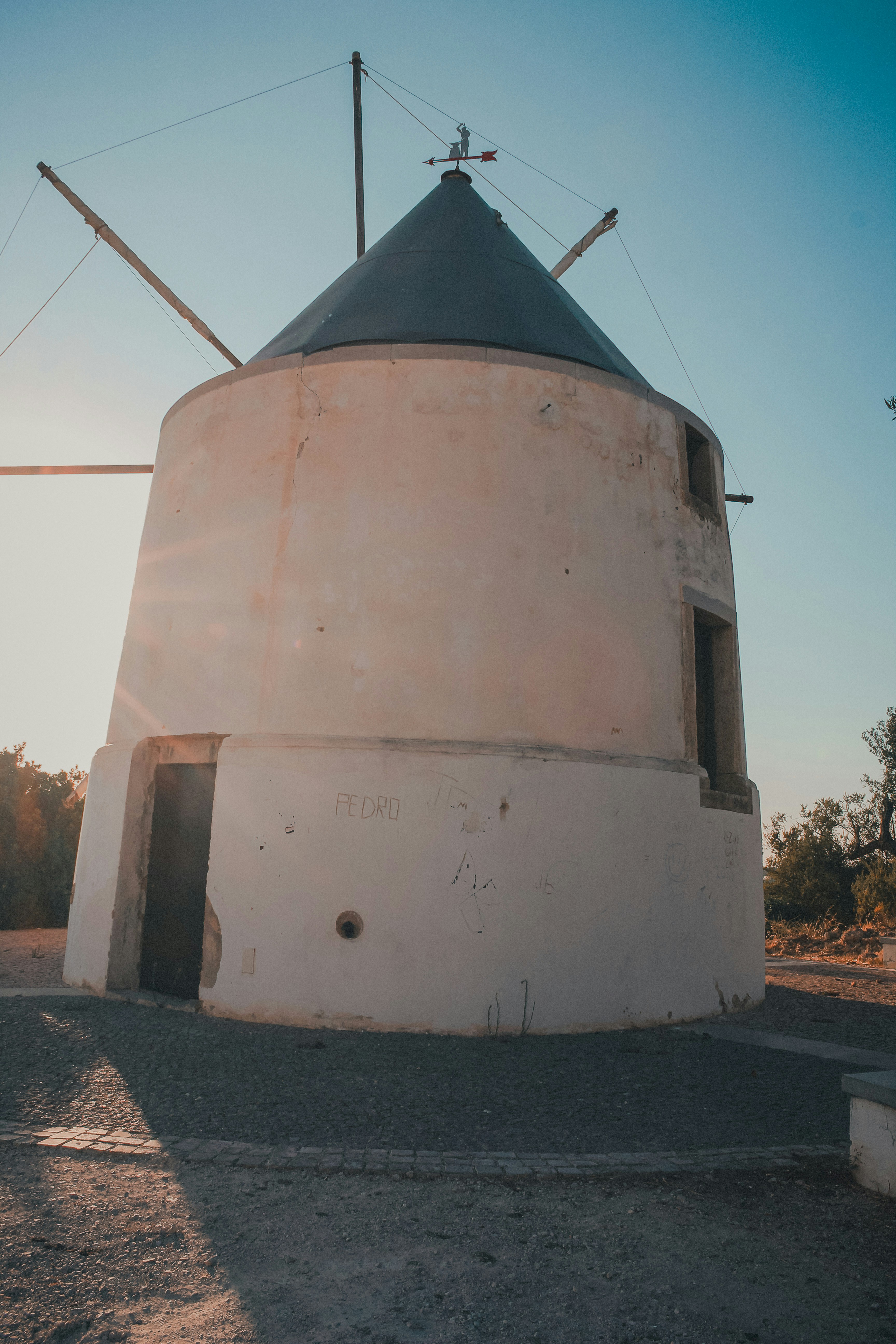 Windmill Keeperscape: A Quiet Beacon under a Salt-Blue Sky
