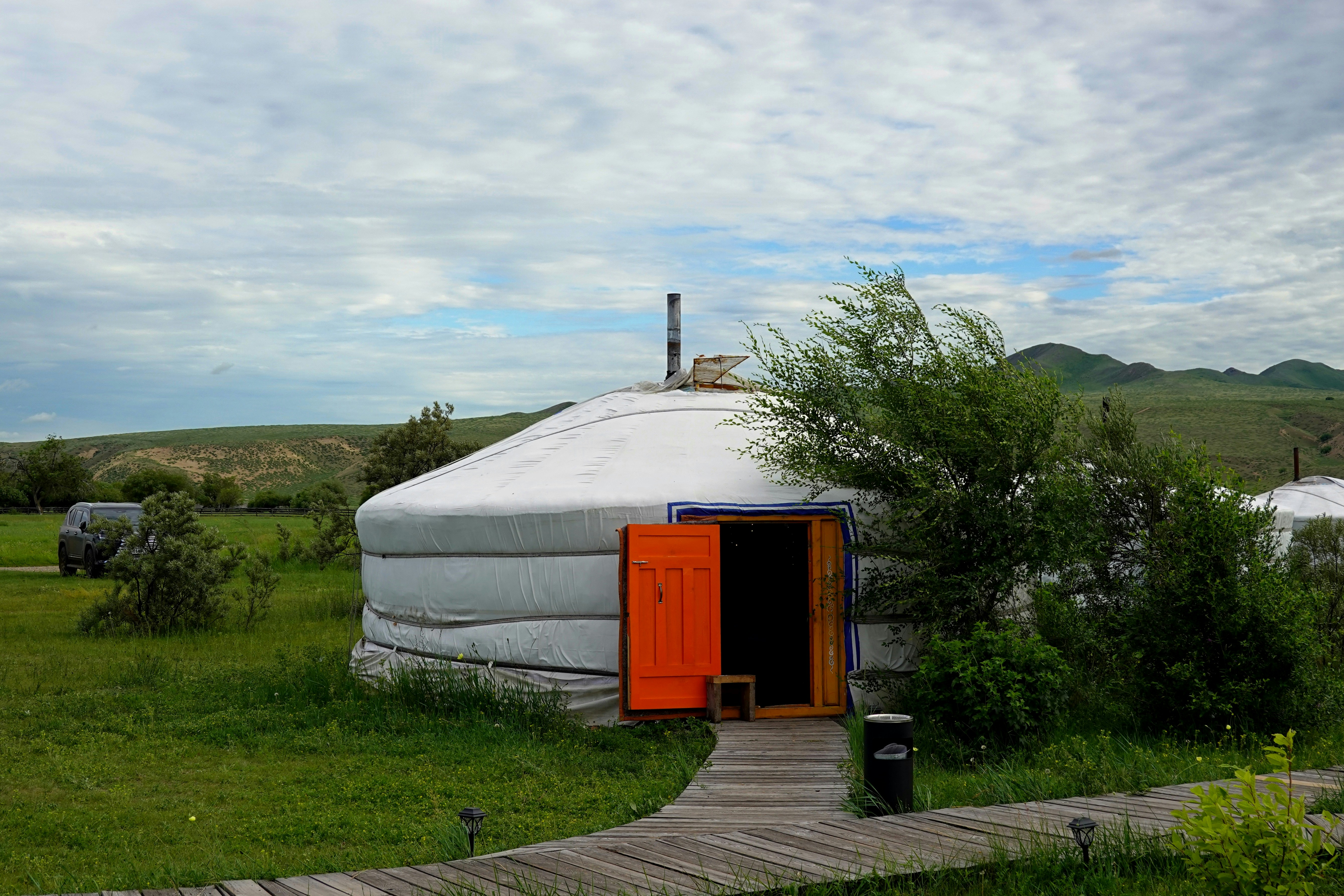 Orange Doorway of the Yurt: A Quiet Prairie Dwellers’ Retreat