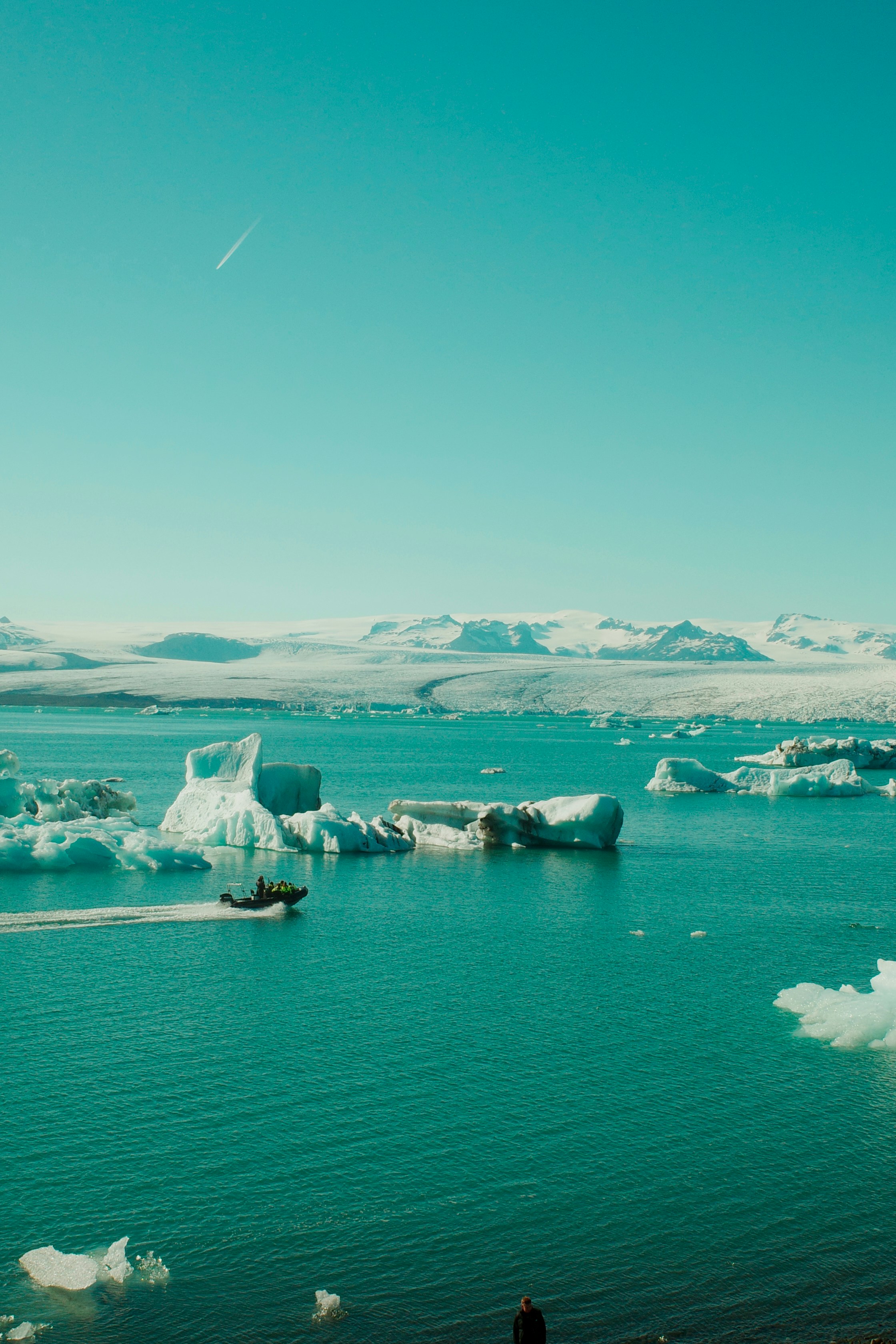 Turquoise Icefield Under a Narrow Sky