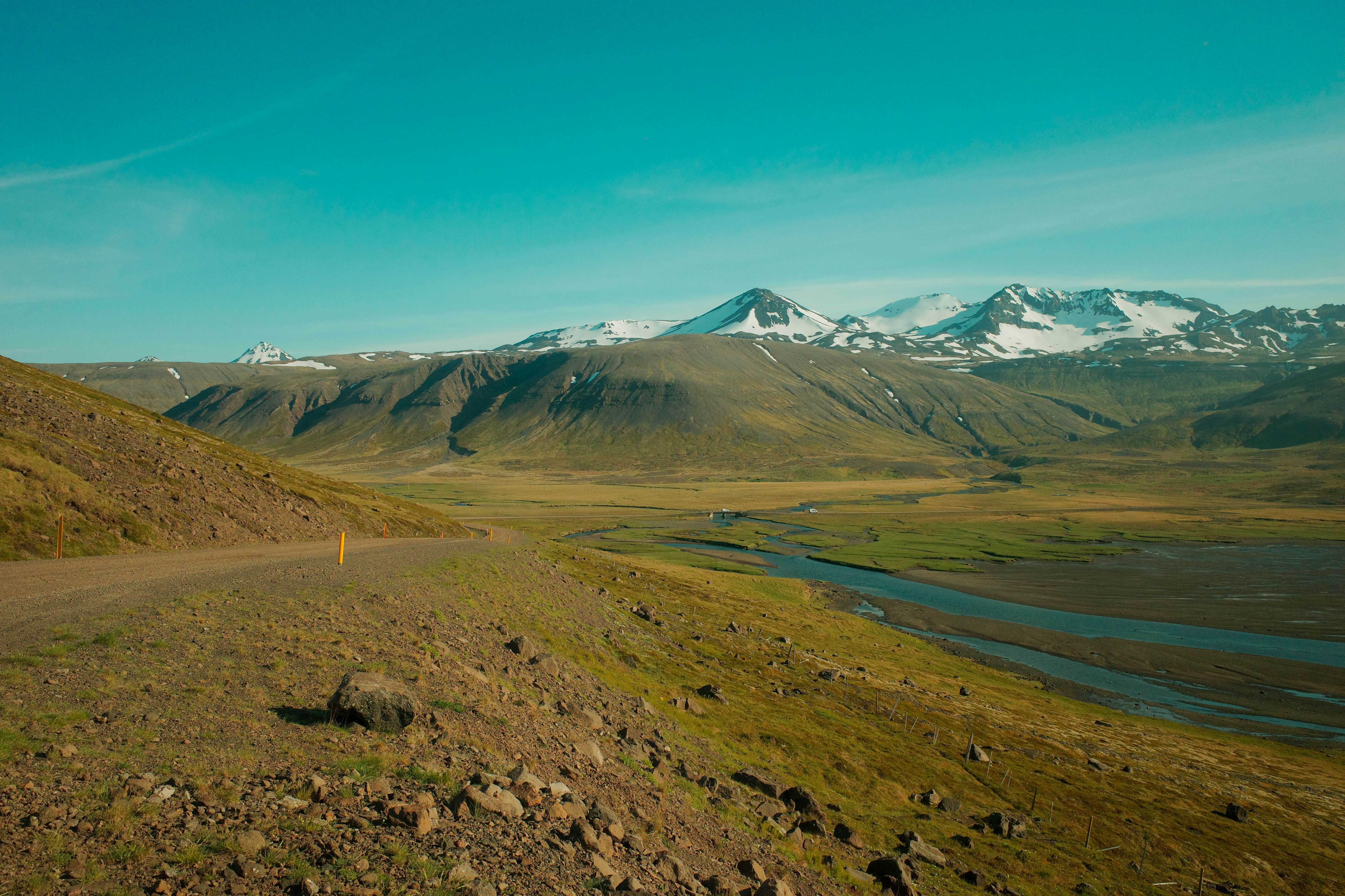 A Tail of Peaks: Alpine River Through Tundra Valleys