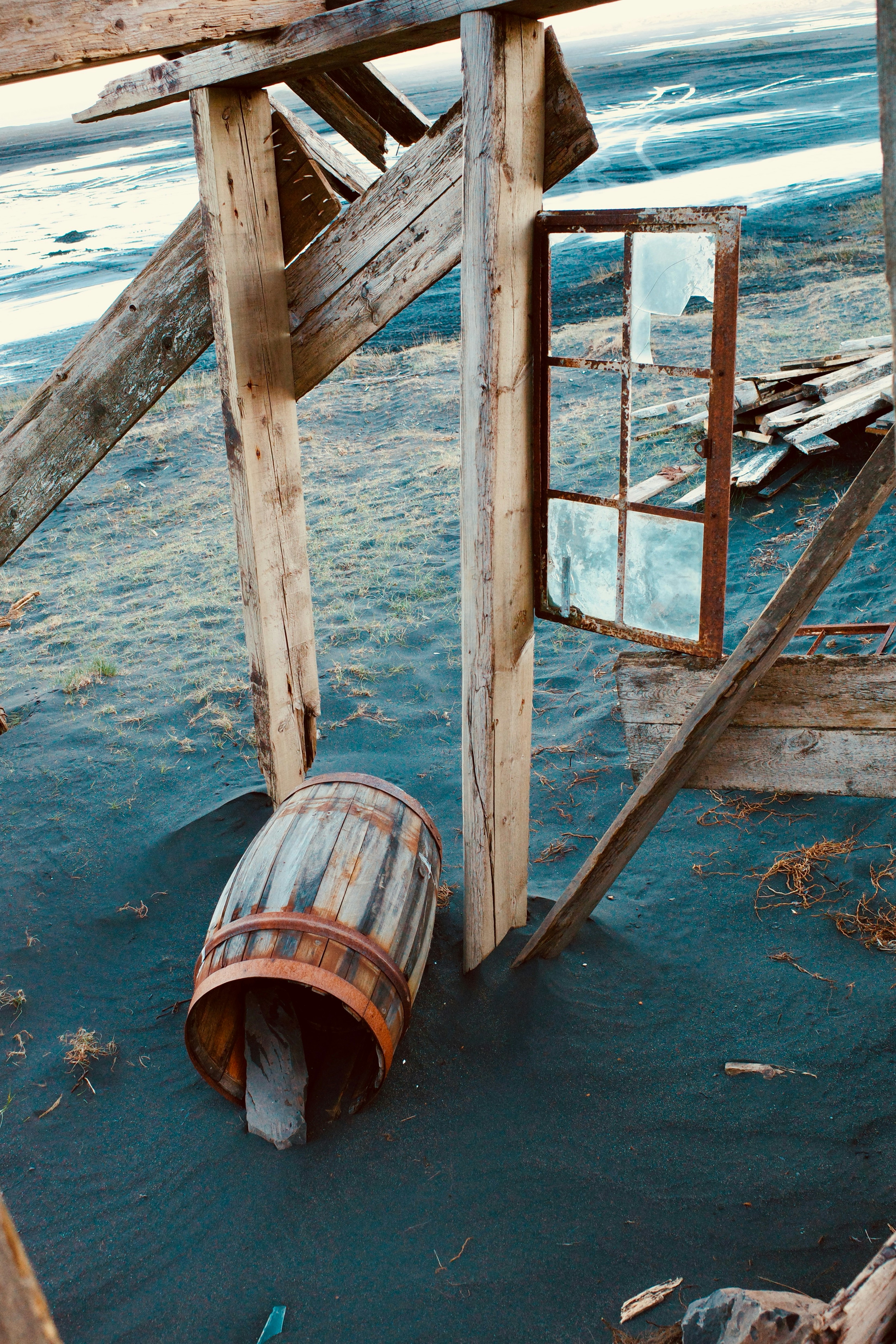 Fractured Lighthouse: A Rusted Window to the Sea