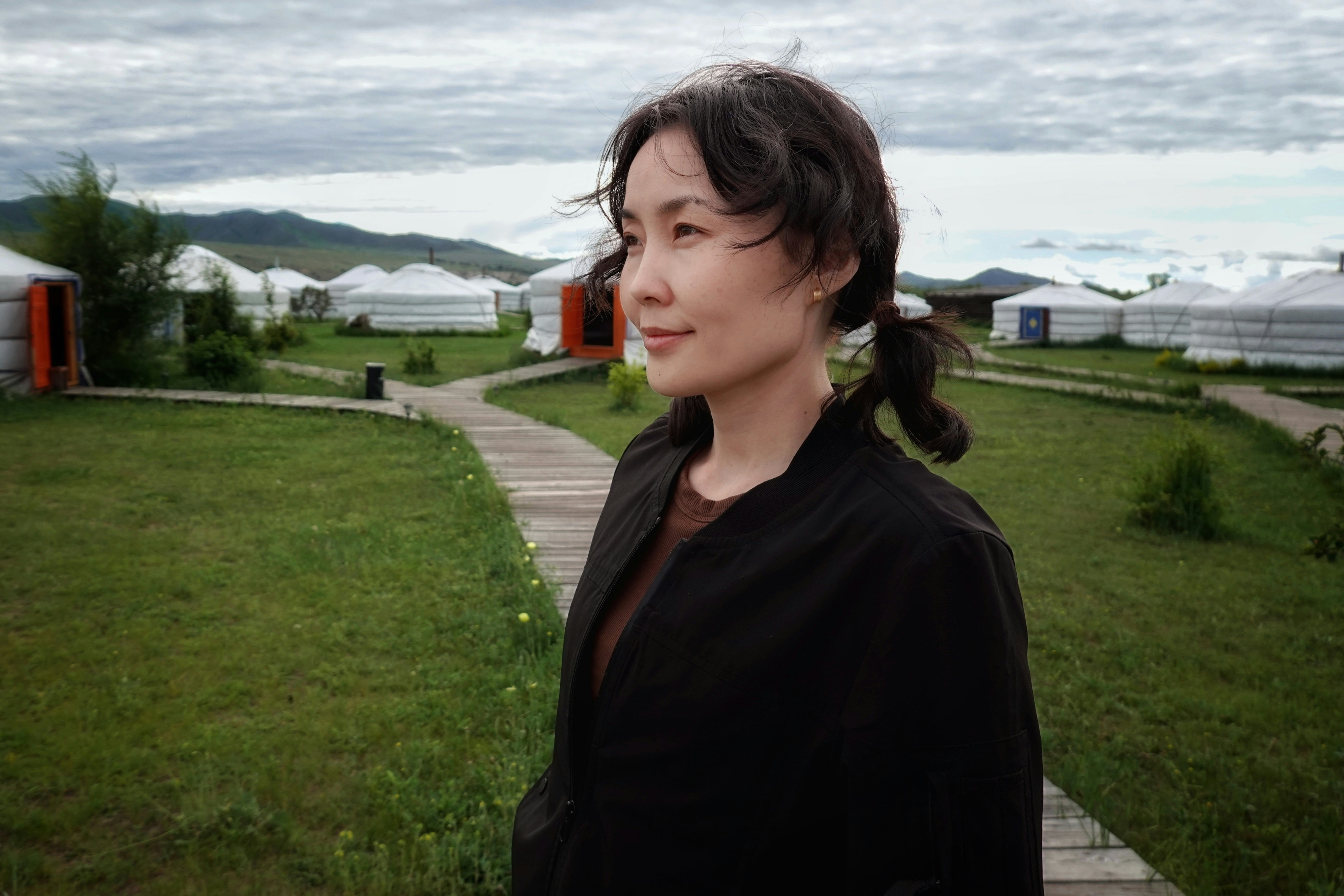 Portrait in a Green Corridor: Quiet Confidence by the Path