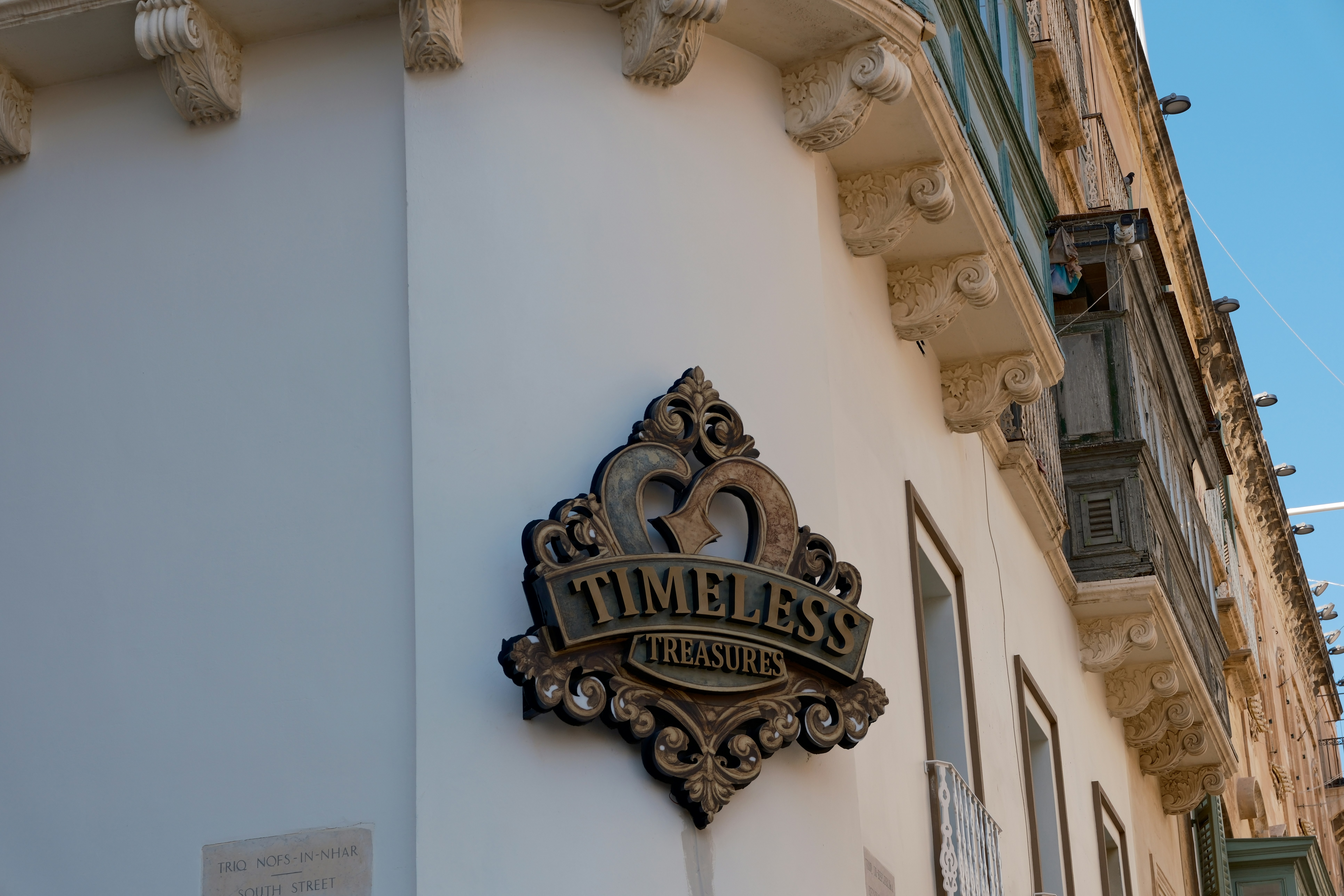 Timeless Sign: The Timeless Treasures of a Quiet Facade