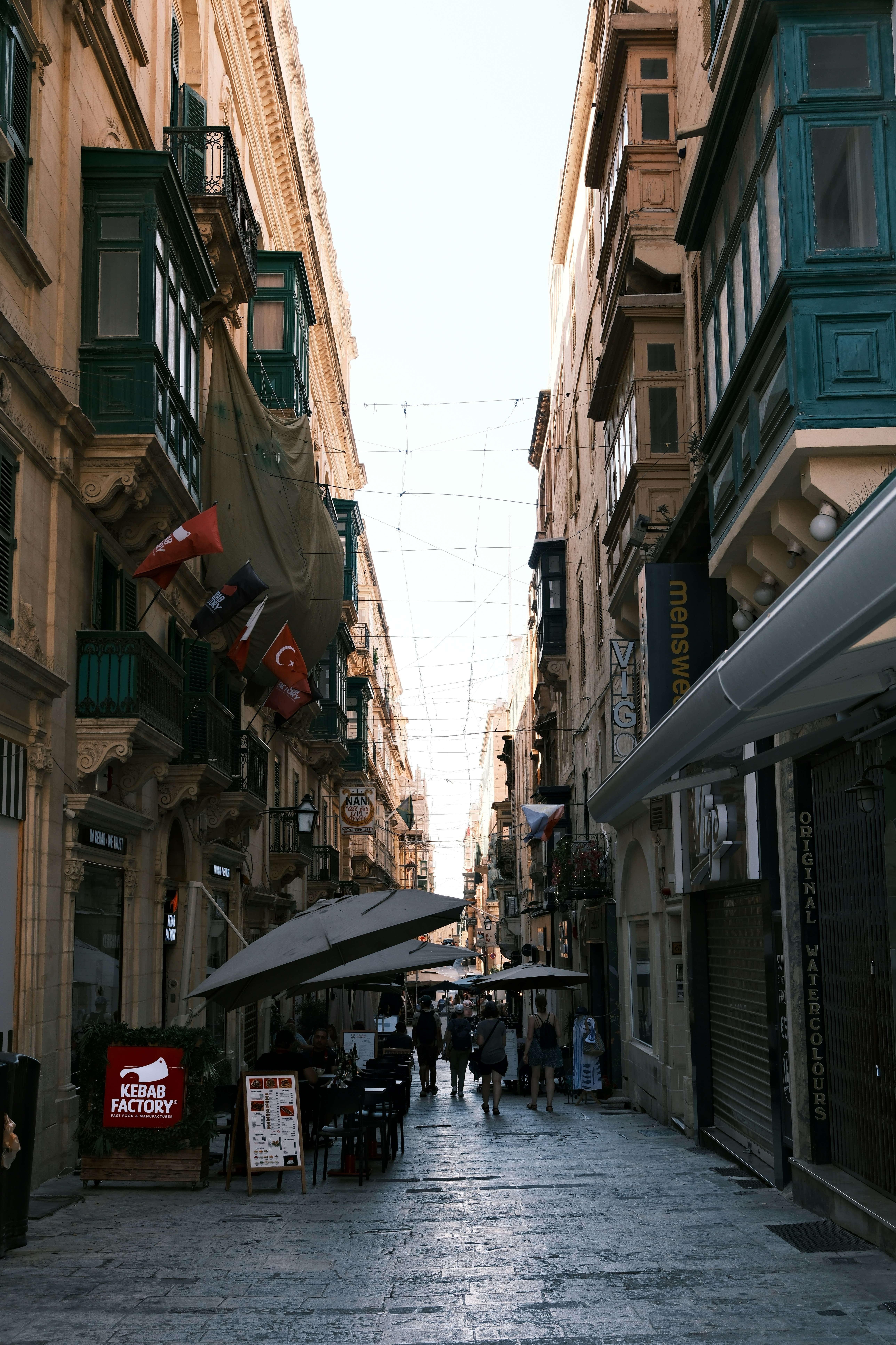 Canyon of Narrow Callejas: Sunset Café in a Historic European Alley