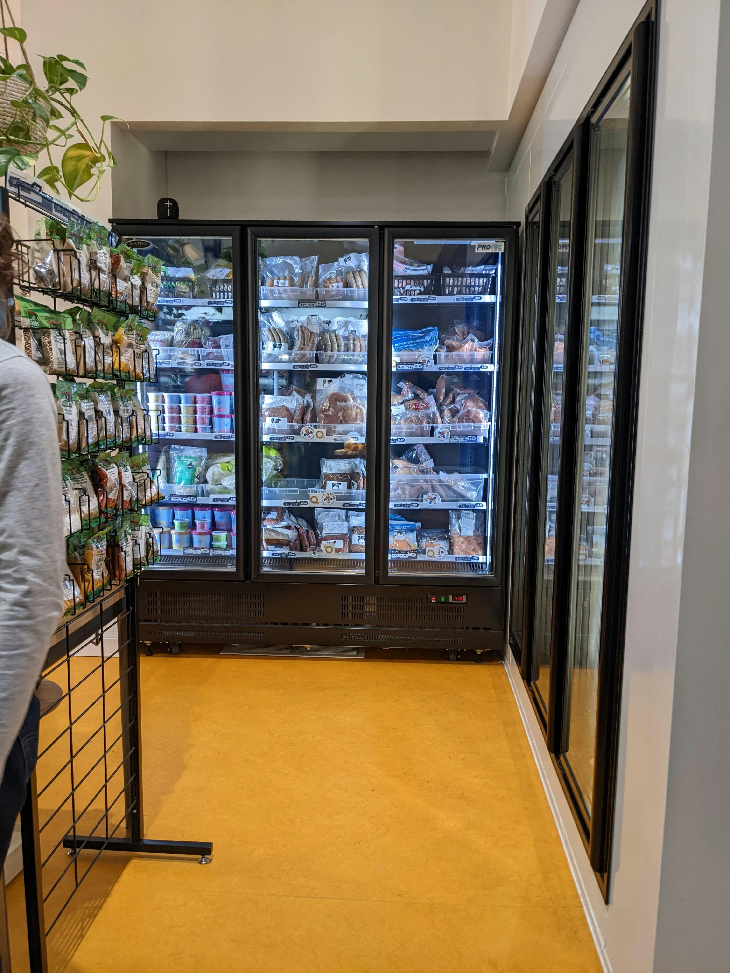 Sidelined Aisle: Cold Storage Center Framed by Shelves