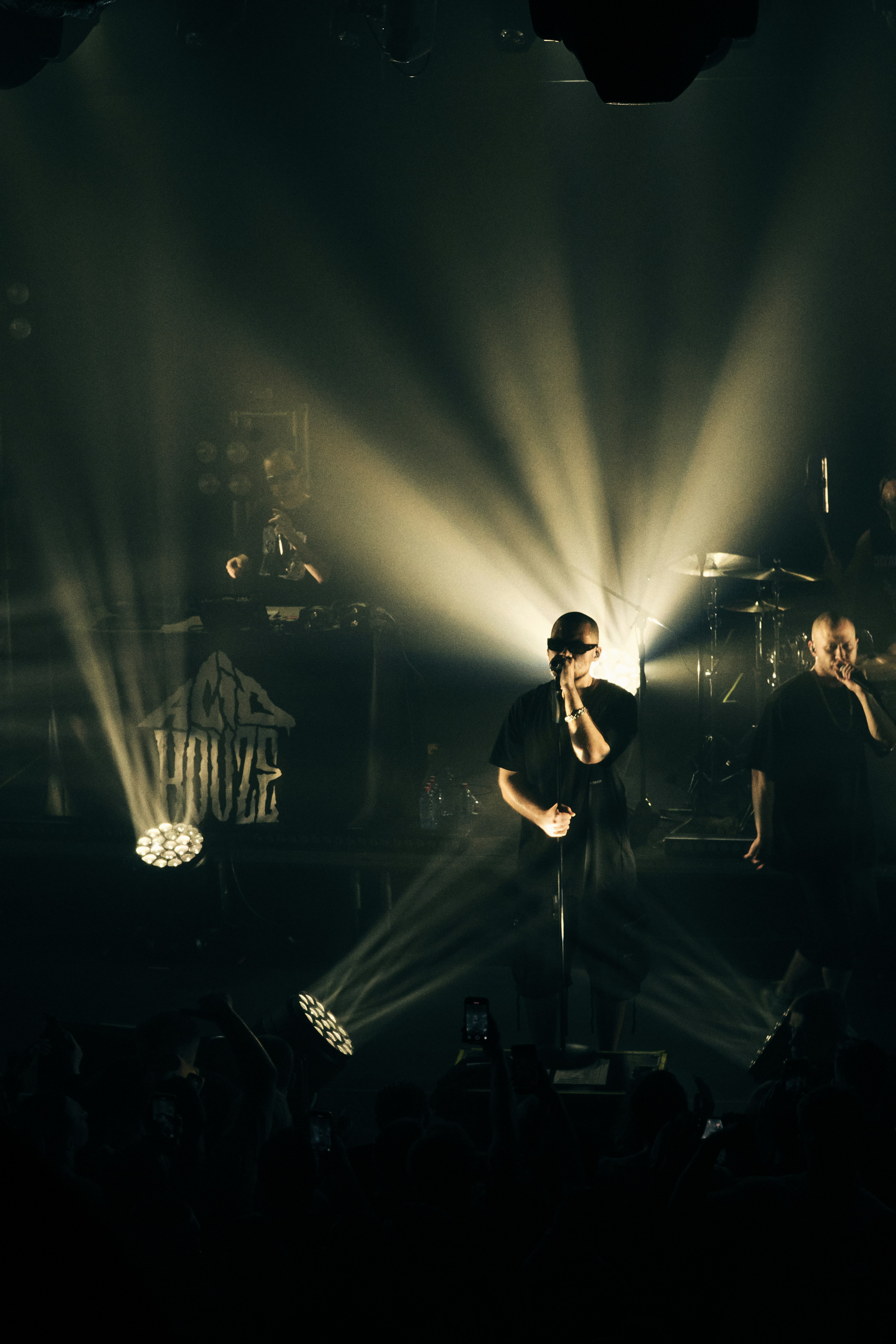 Spotlight Core: Vocalist Centered in a Beam-Washed Stage