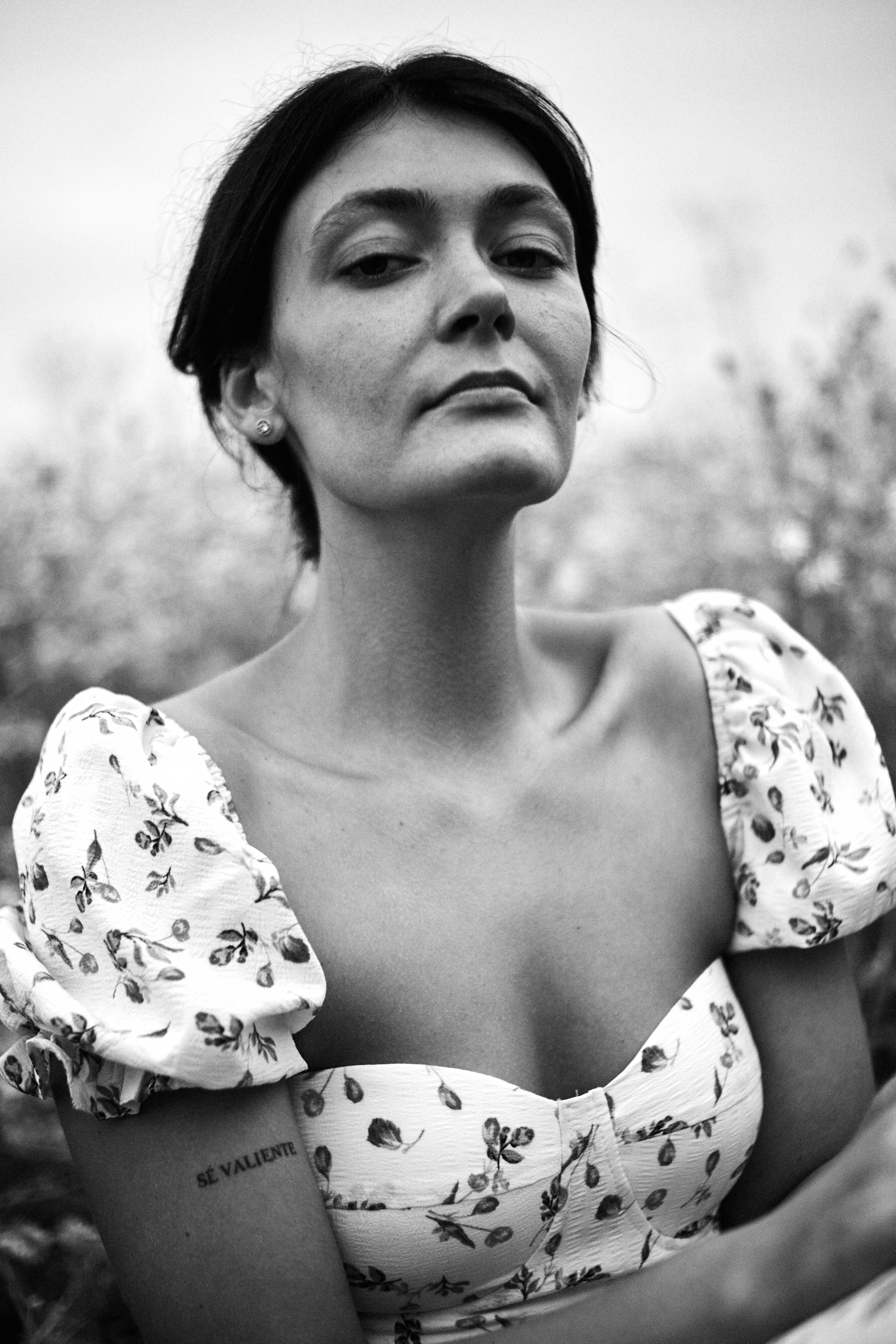 Portrait in Soft Focus: Quiet Confidence Amid Open Fields