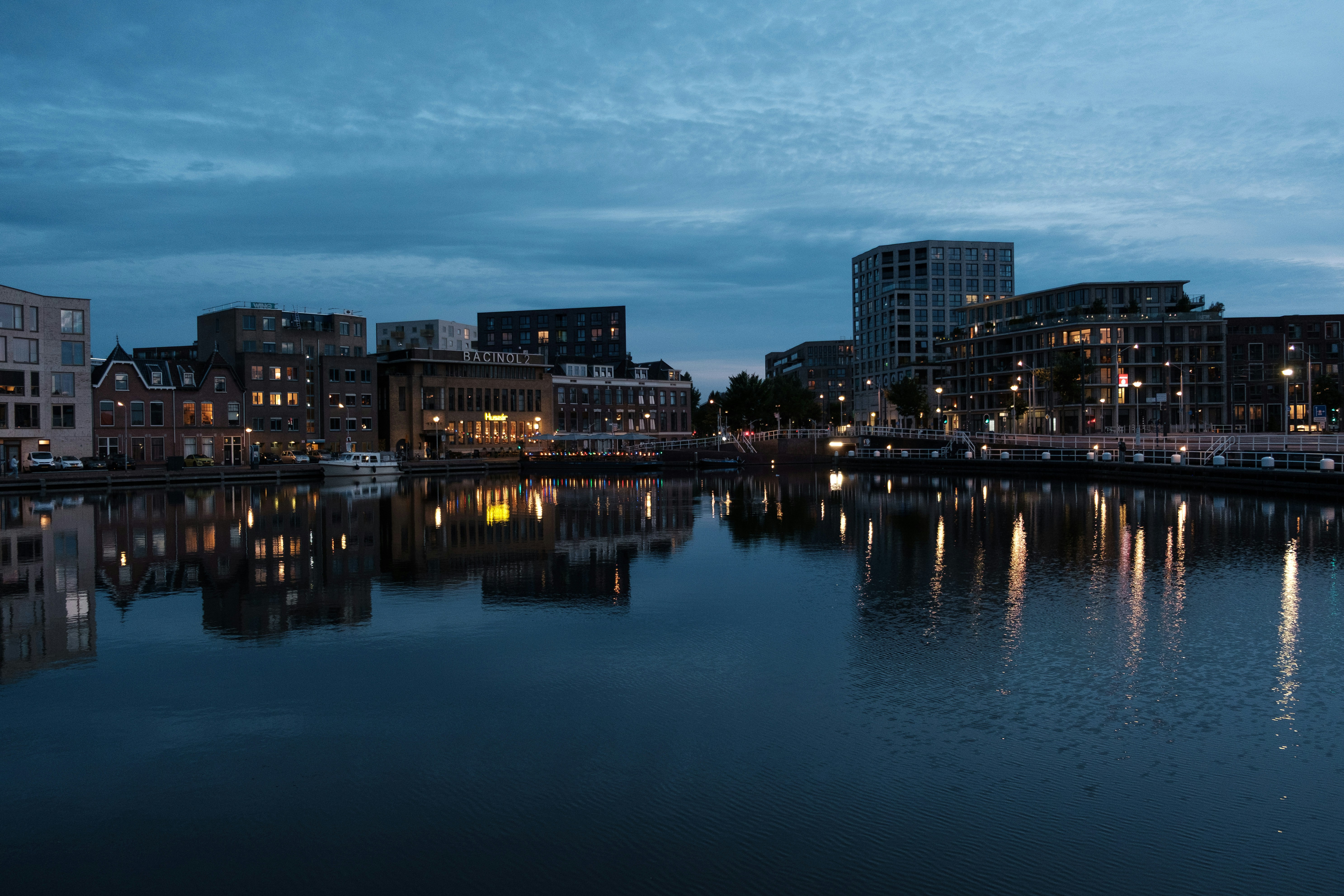 Evening Harbor: Reflections Wreathe a Quiet City