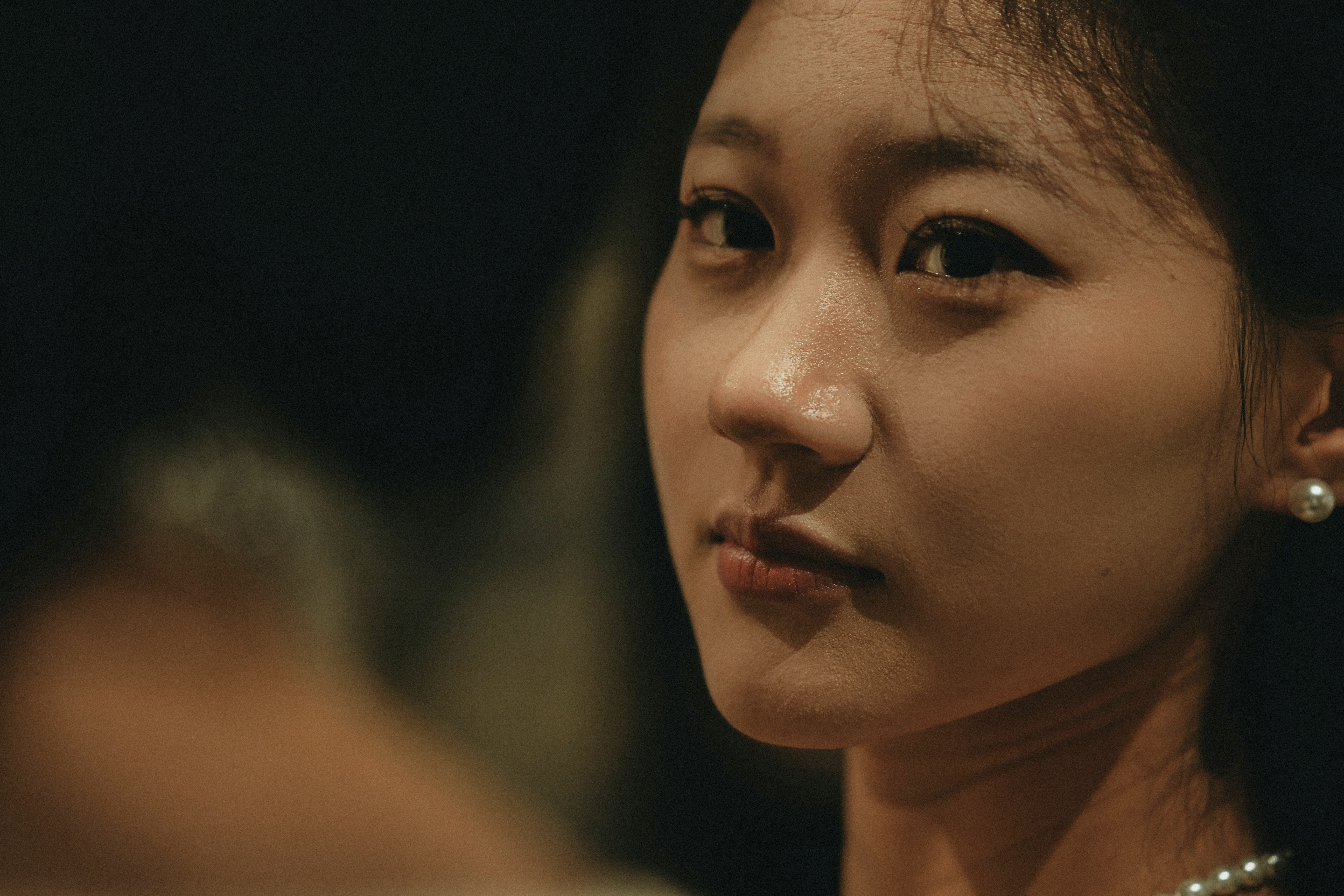 Whisper of Light: A Portrait in Subtle Shadow