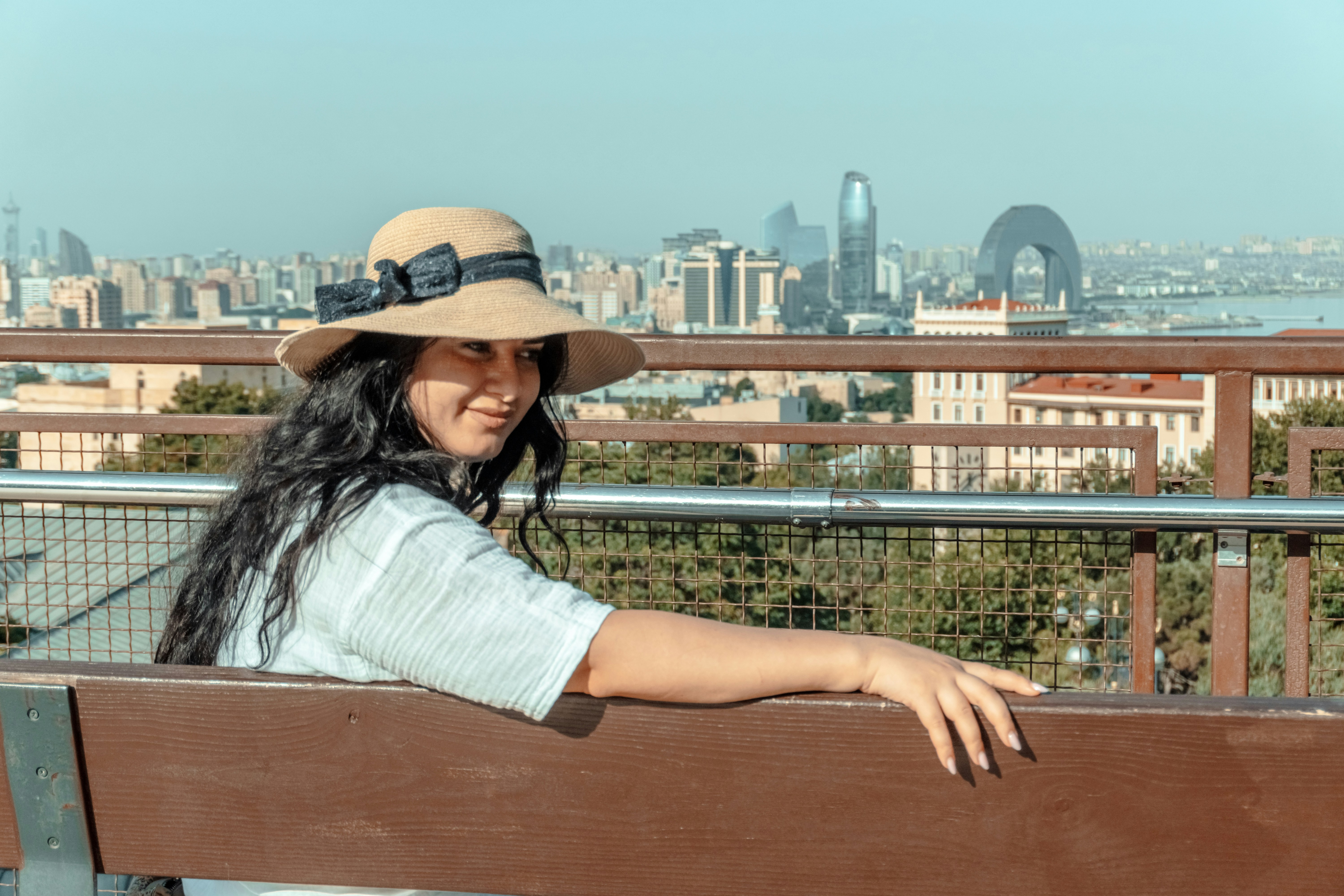 Rooftop Moment: A Quiet Gaze Against the Cityscape