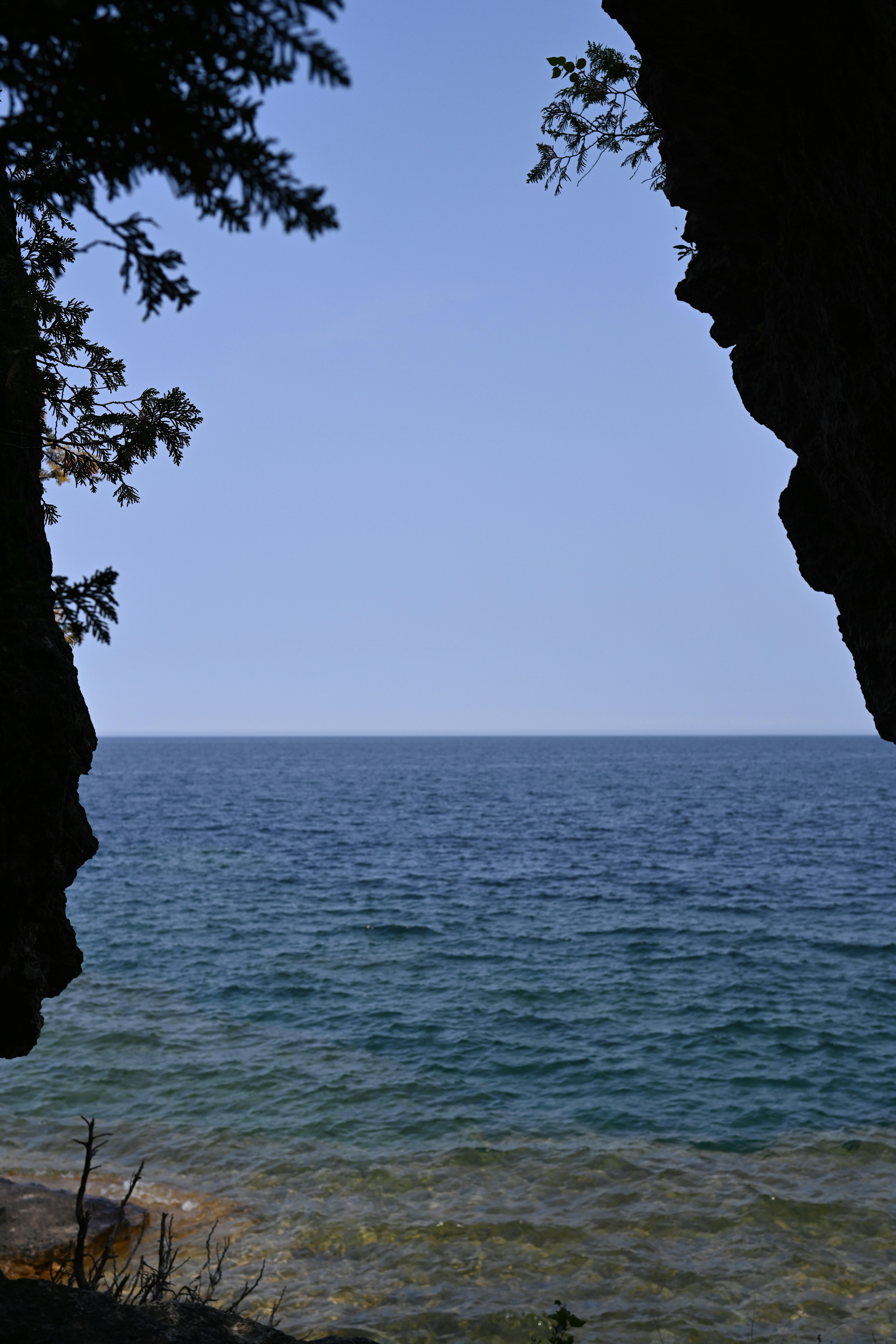 Sea Gap: A Quiet Pier Between Rock Formations