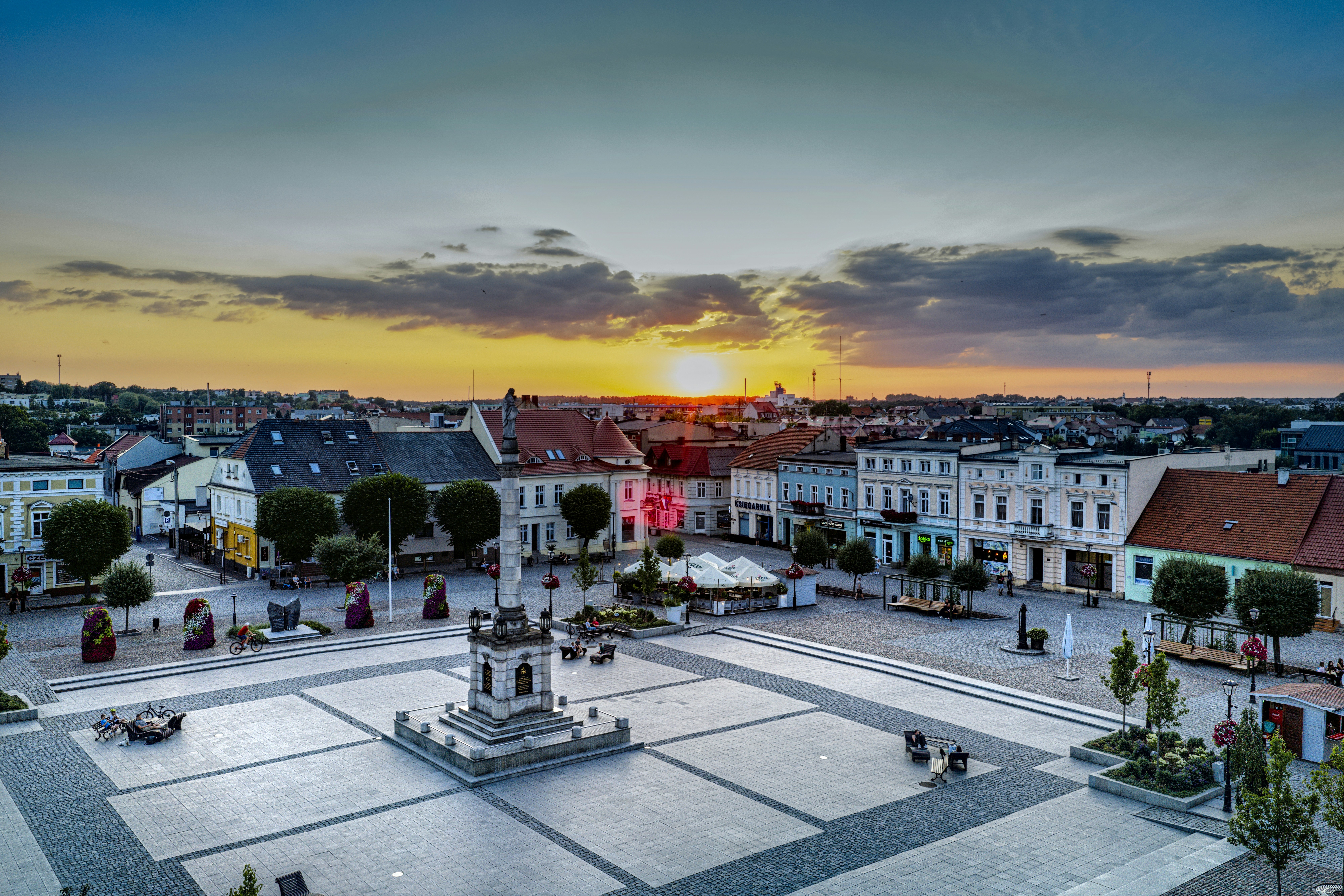 Sunset Over the Town Square: A Quiet Pedestal of Place