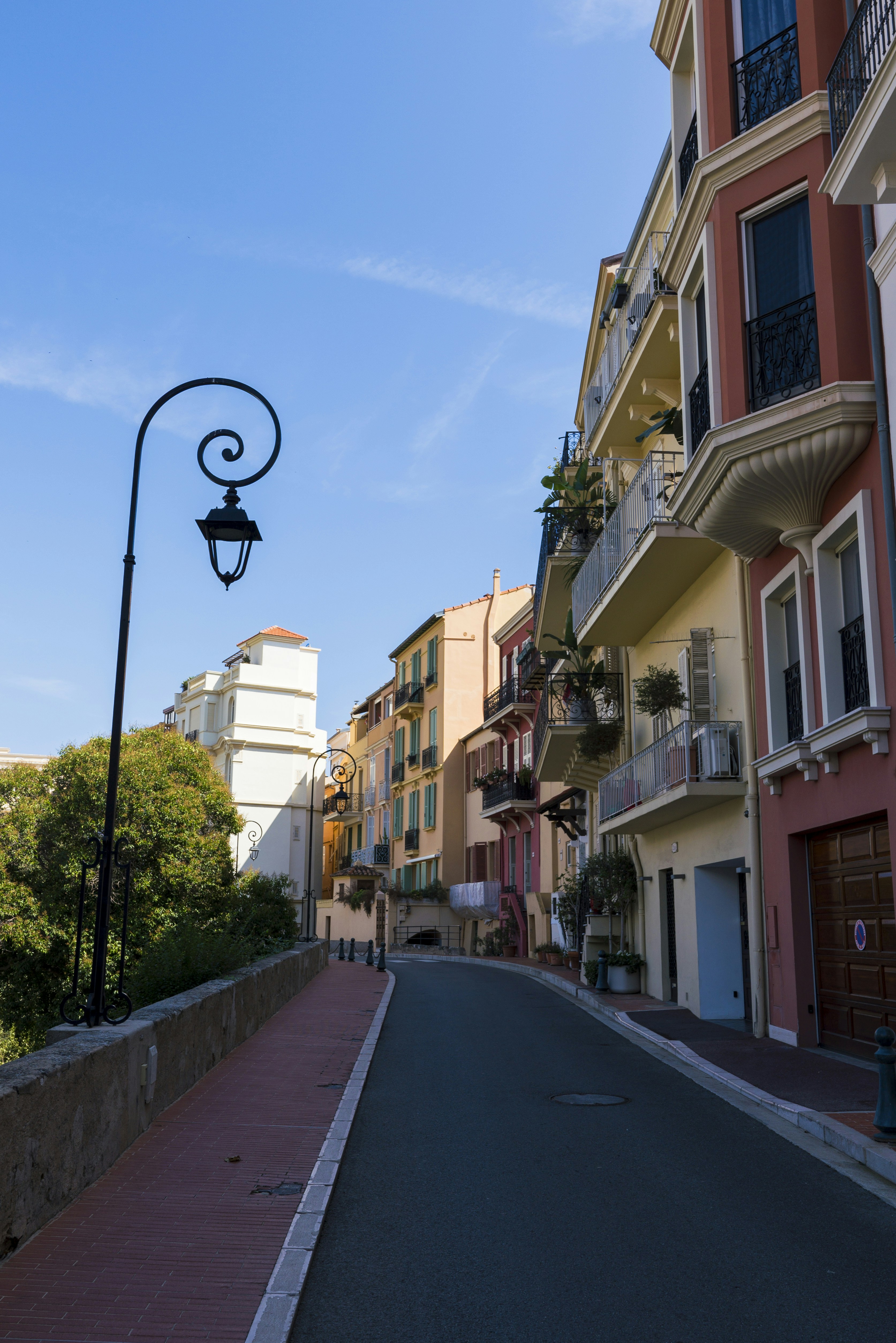 Canted Charm Along a Sunset Calle: Colorful Flats and a Winding Street