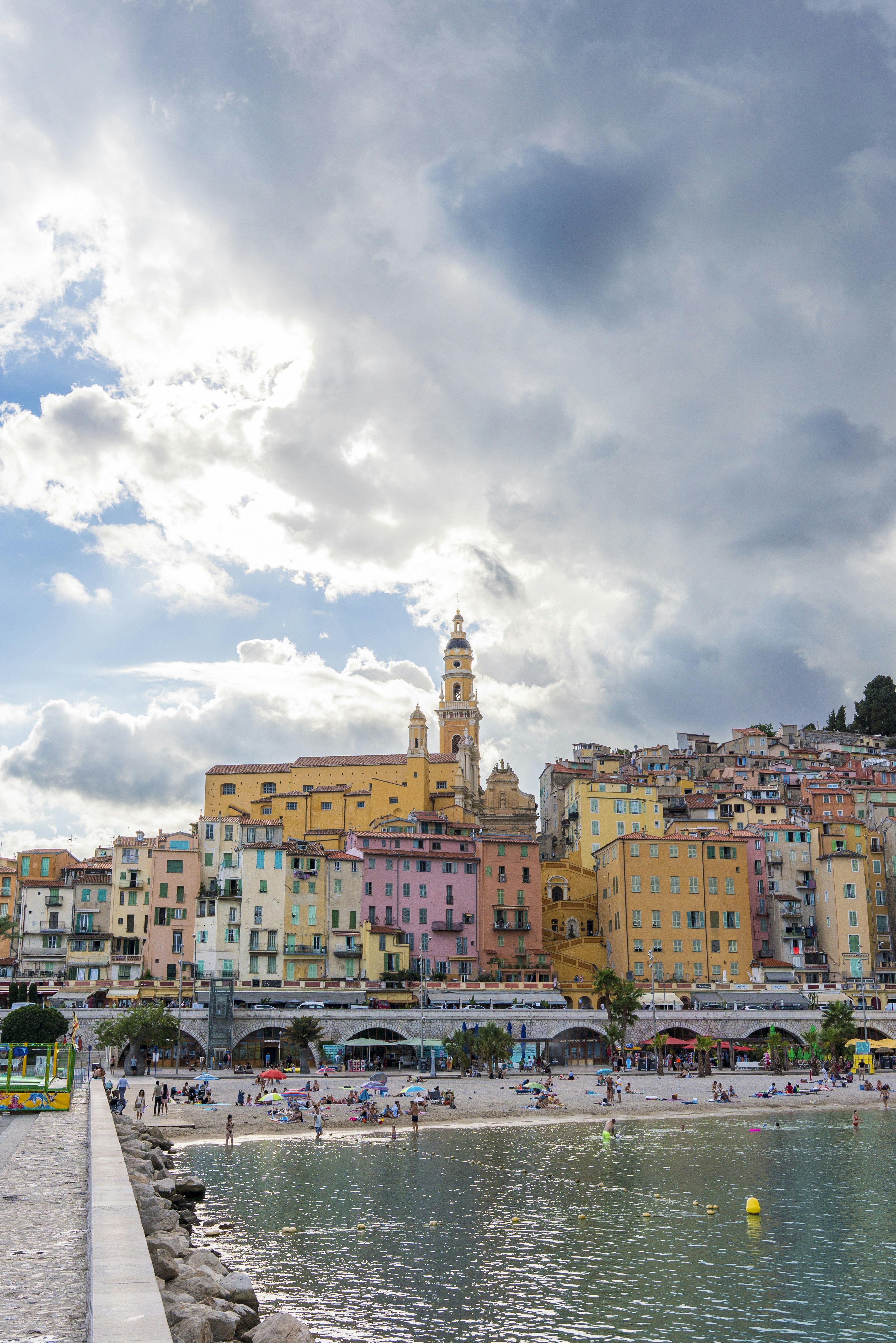 Pastel Village by the Sea: A Mediterranean Coastal Panorama