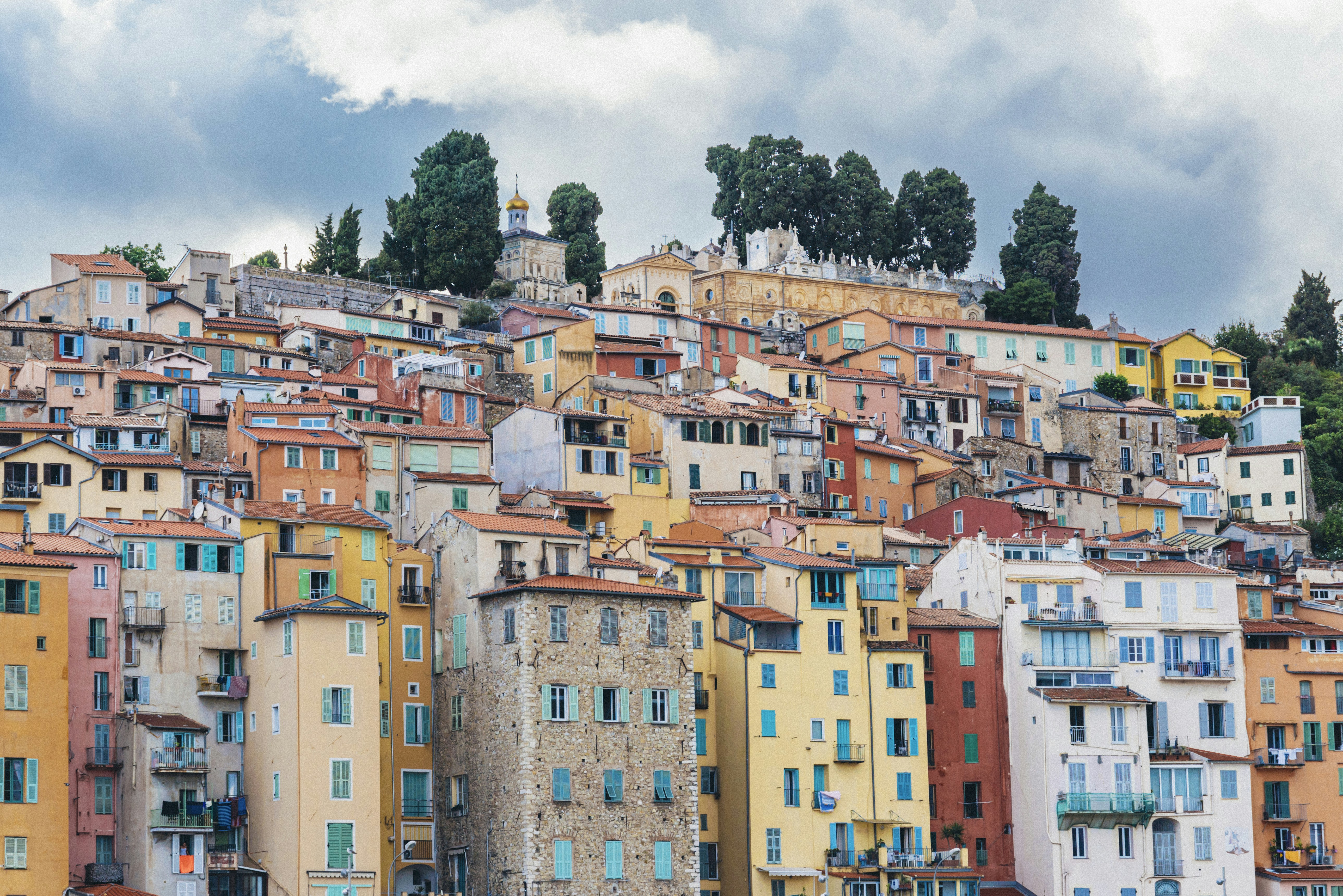 Colorful Village Cascade: A hillside of sunlit homes