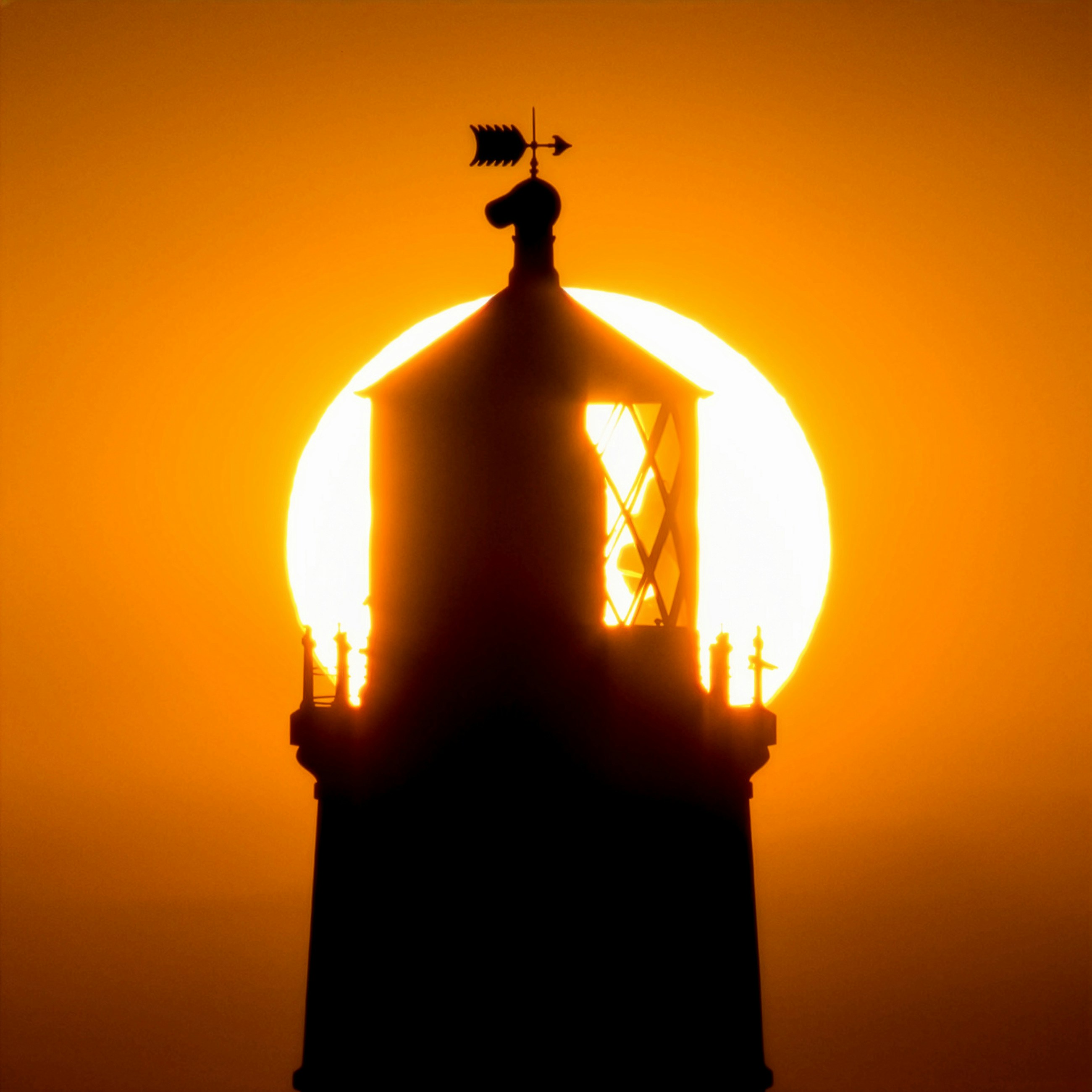 Sunlit Sentinel: A Lantern Tower in the Glow