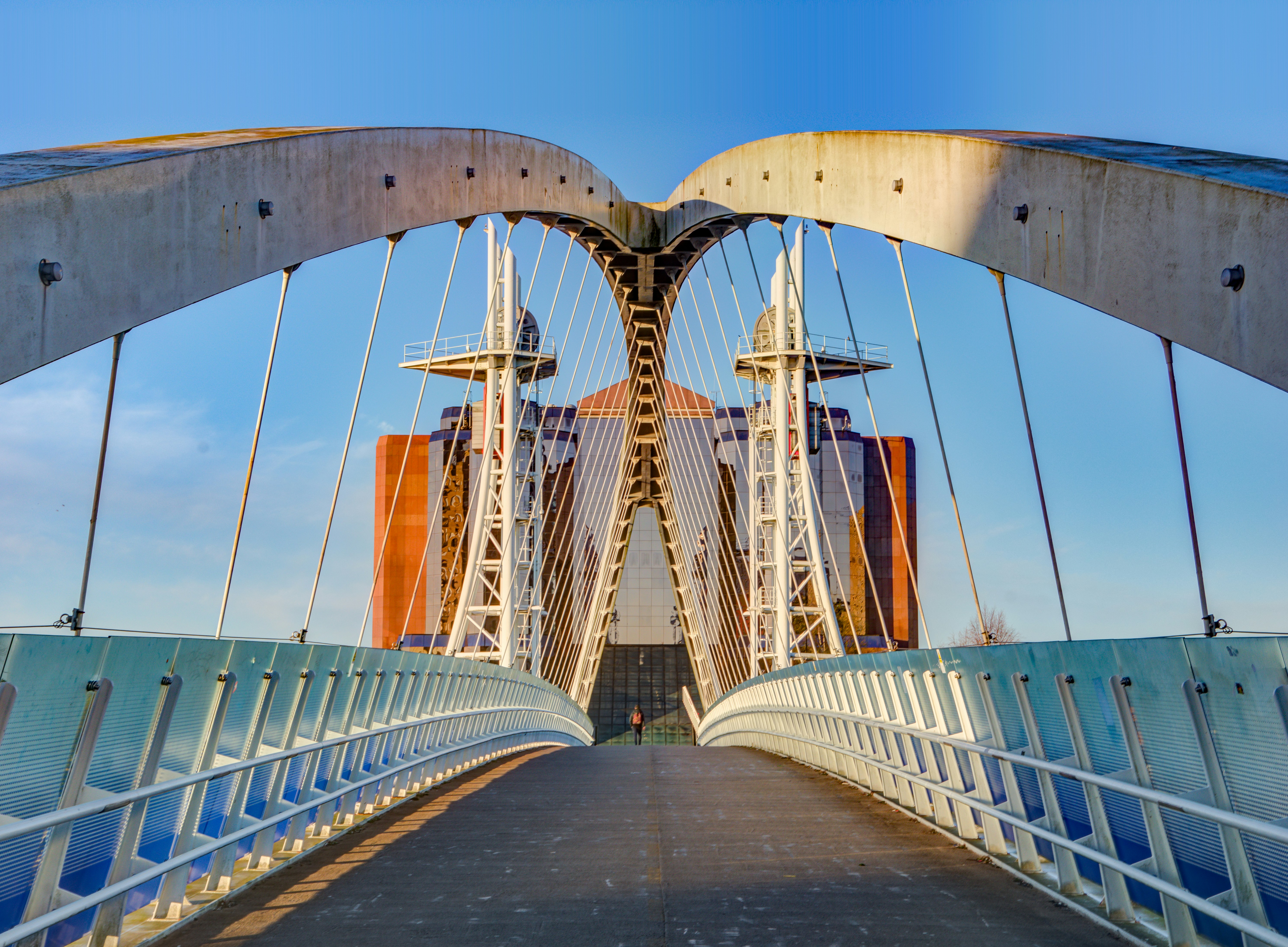 Symmetry at the Span: Central Archway Framed by Cables and Path