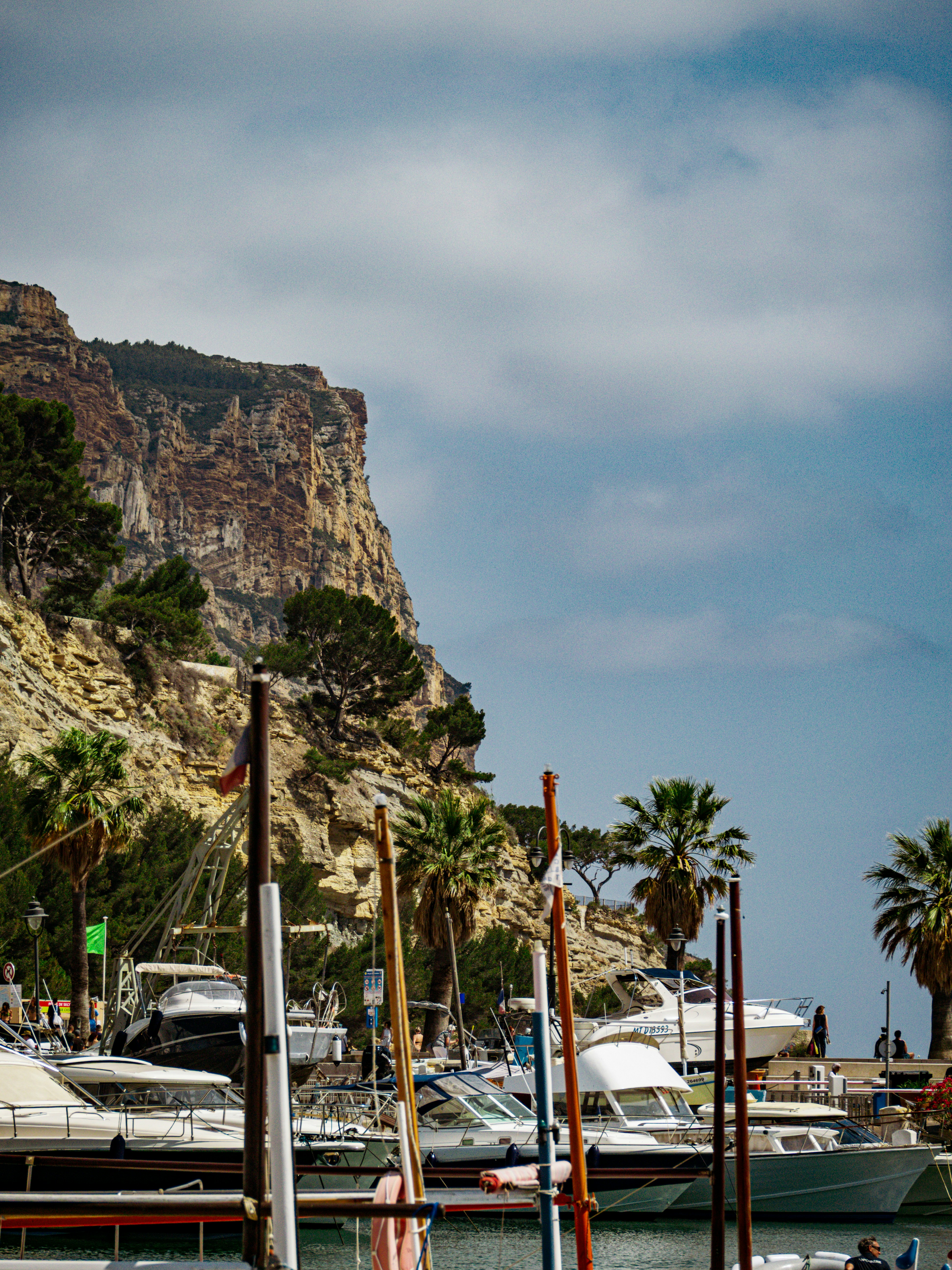 Harbor of Stone and Sails: Cliffside Marina at Dusk
