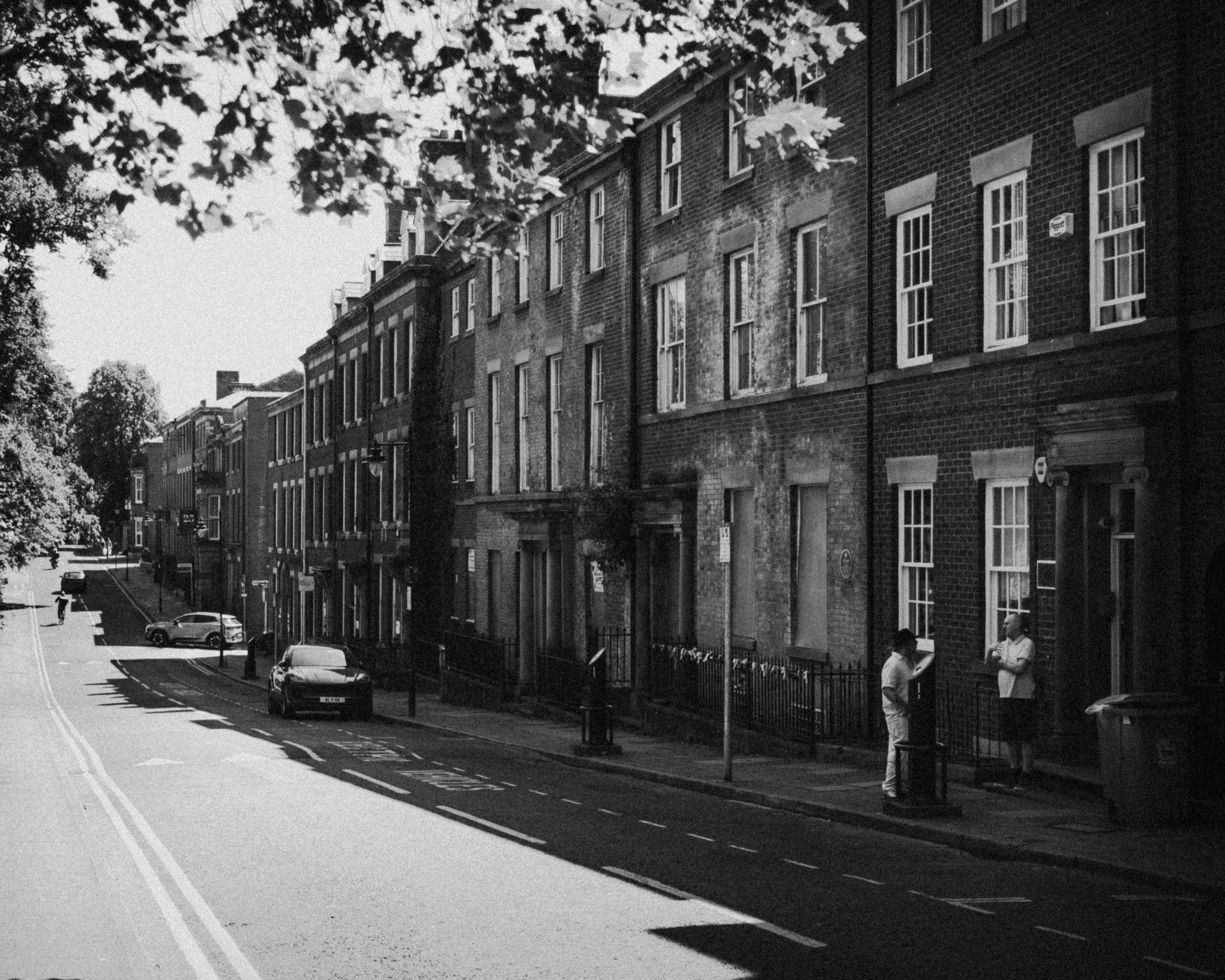 Quiet Covent Lane: A Row of Brick Townhouses in Soft Morning Light