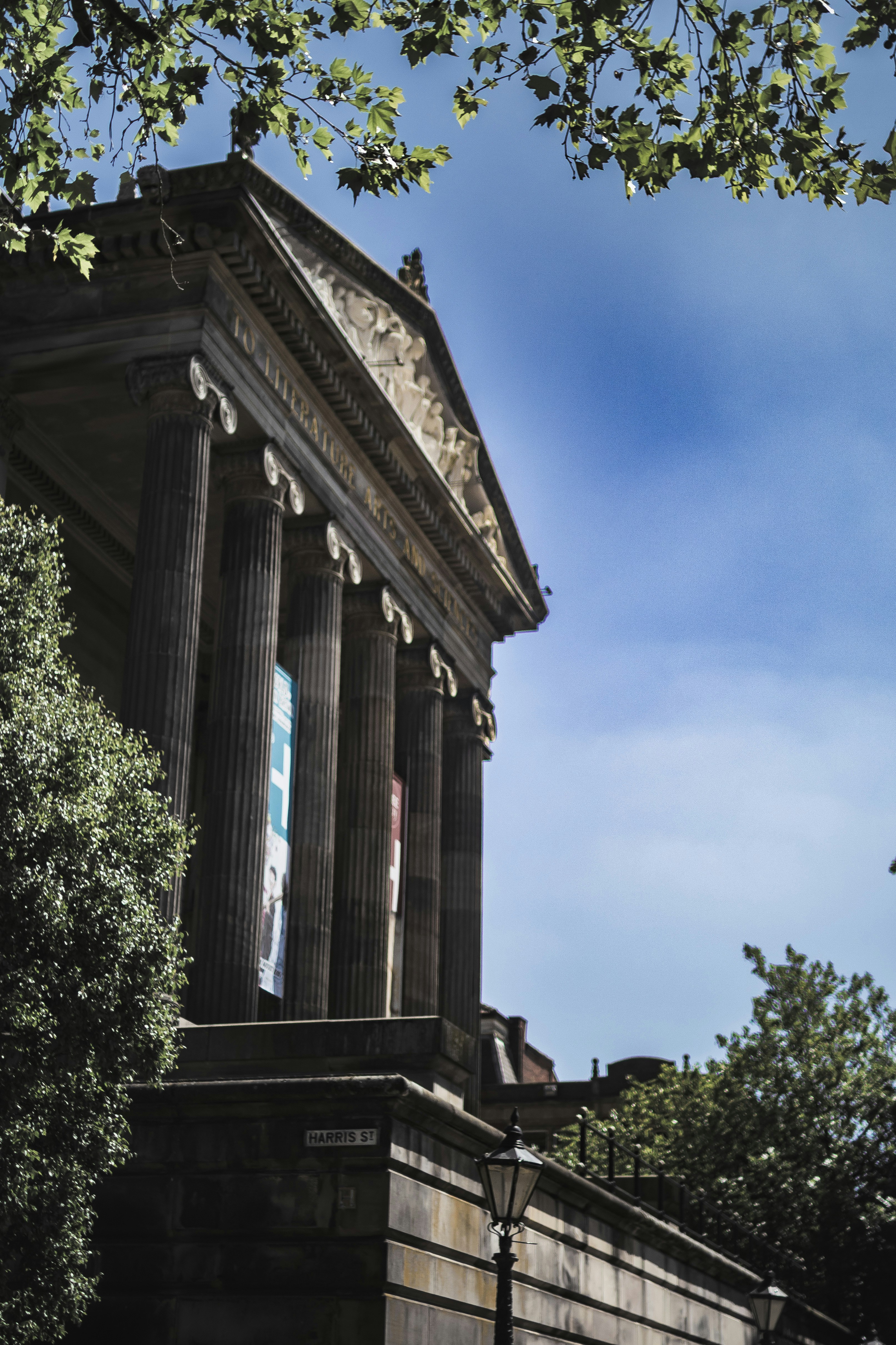 Ancient Temple Facade Rising Against a Clear Blue Sky