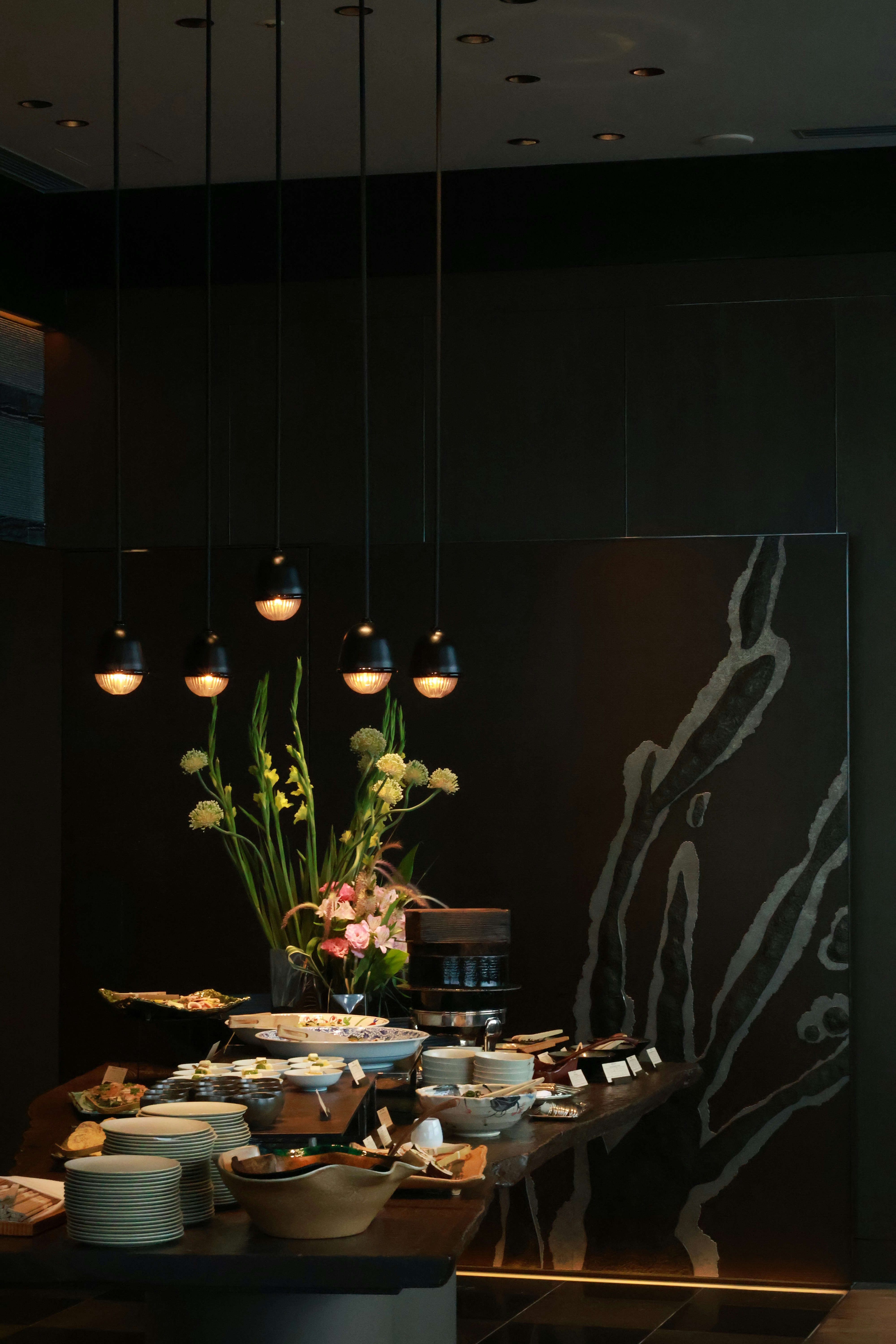 Evening Buffet in a modern dining lounge with a floral centerpiece