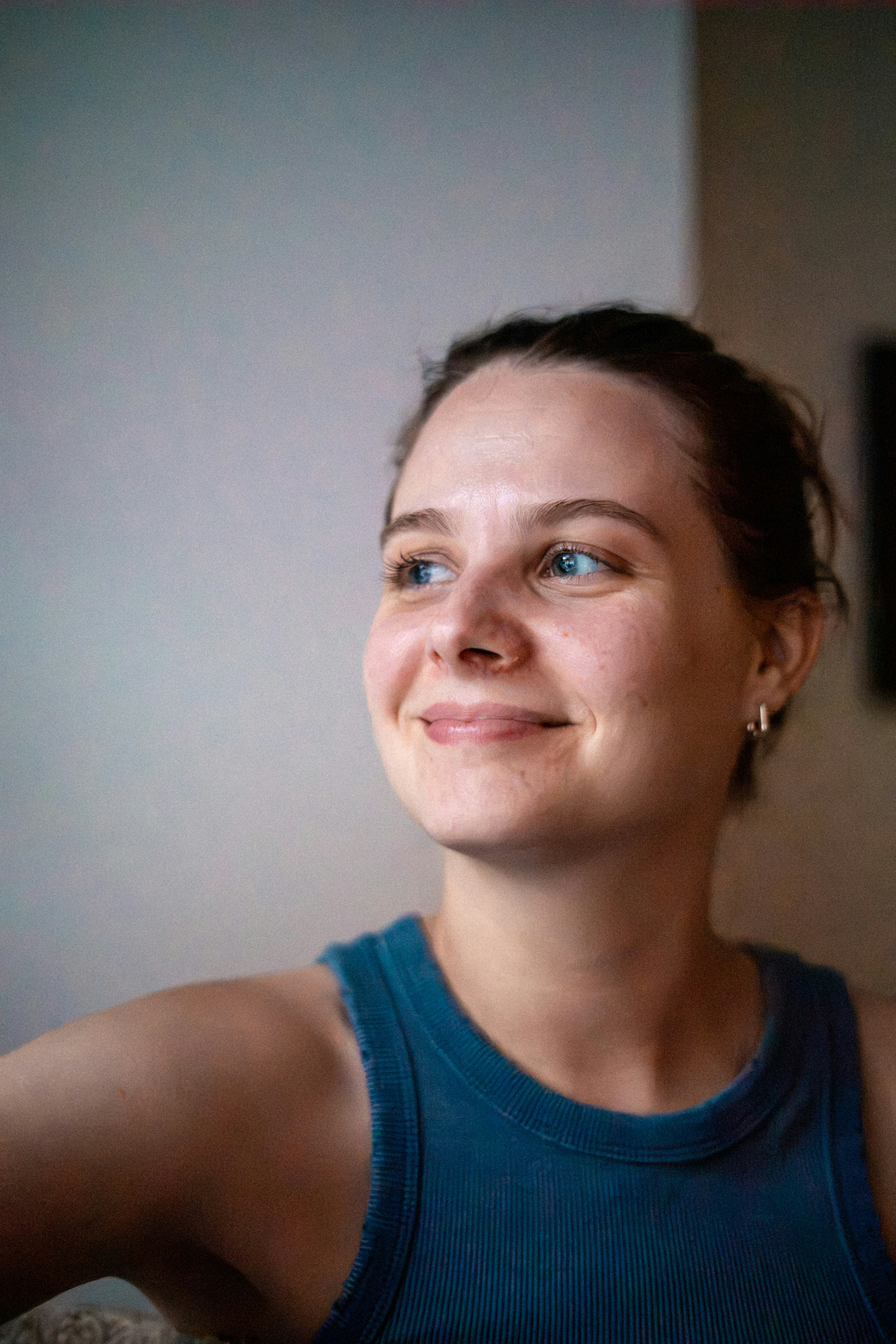 Soft Light, Warm Smile: A Casual Portrait in Quiet Rooms