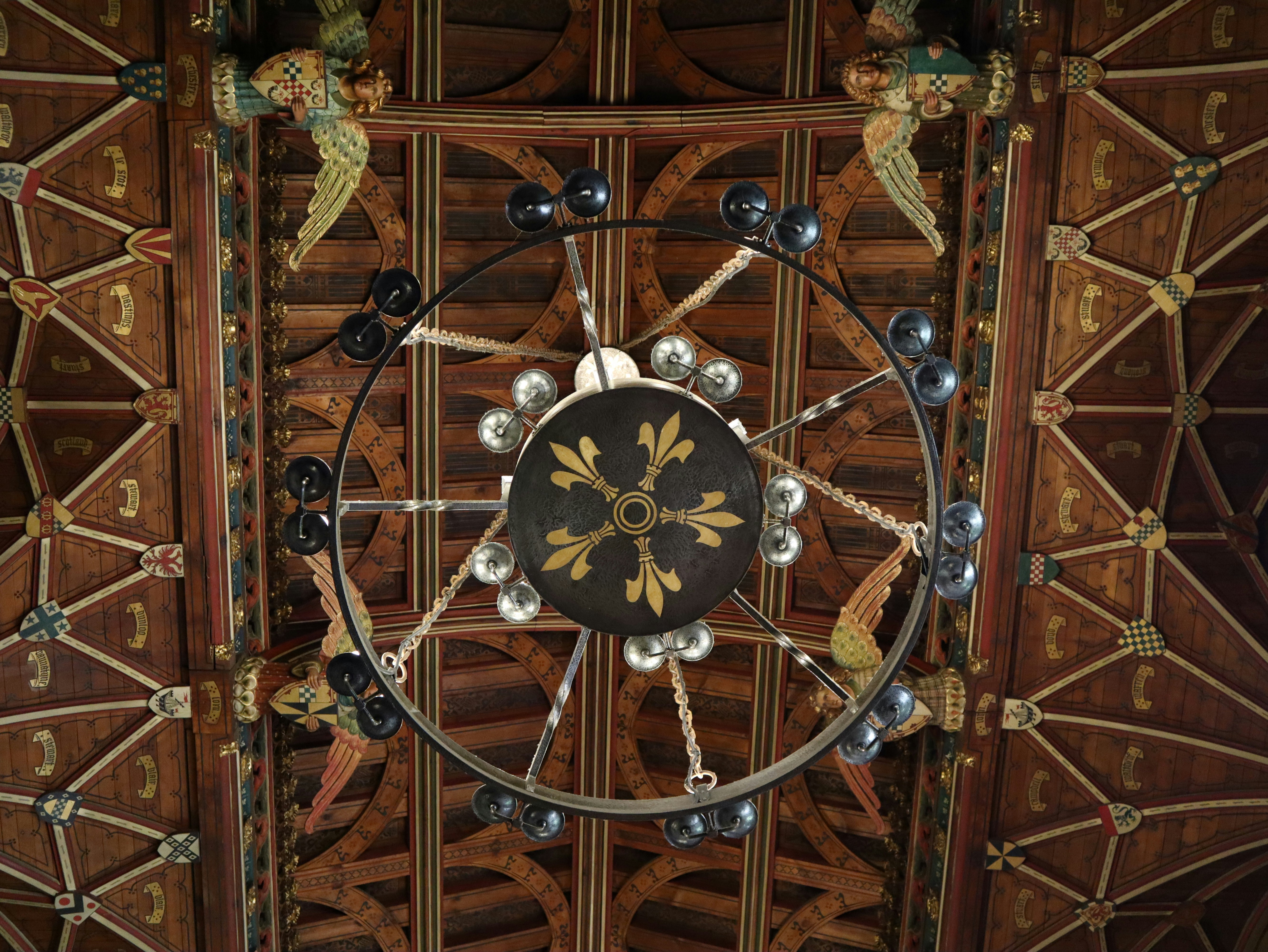 Ornamental Wheel in a Carved Wooden Ceiling