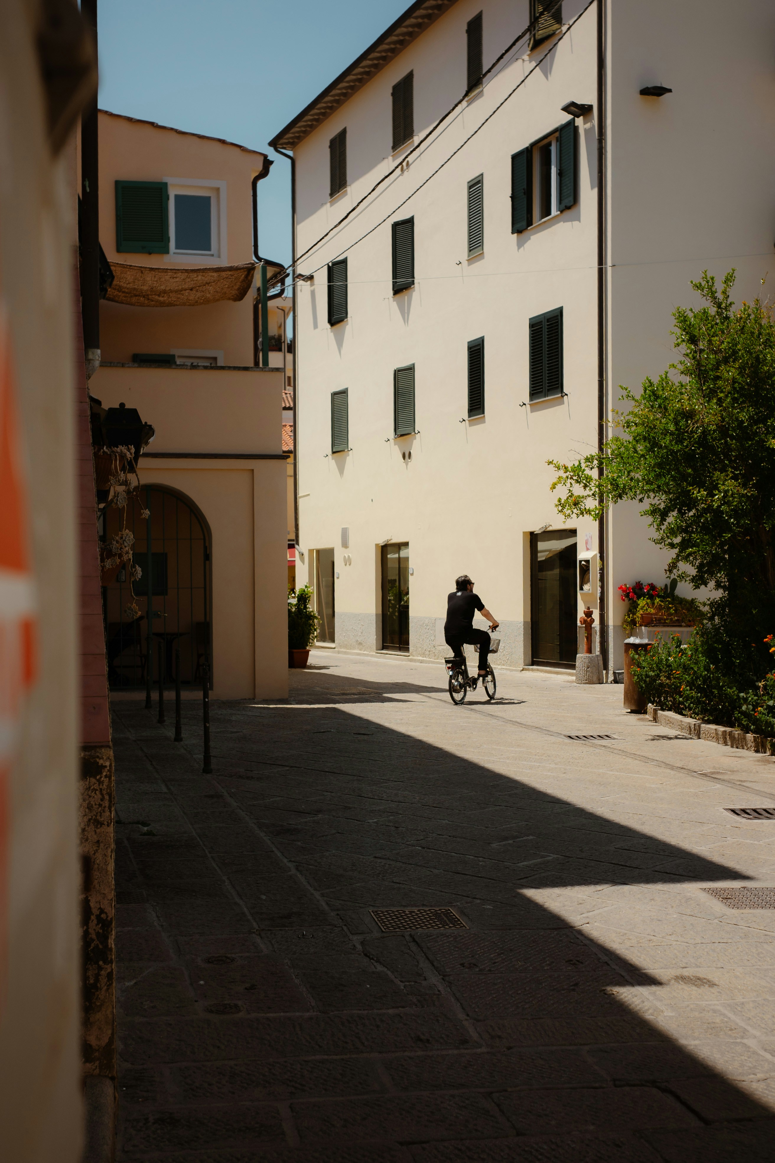 Civic Alley: A Quiet Ride Through Sunlit Streets