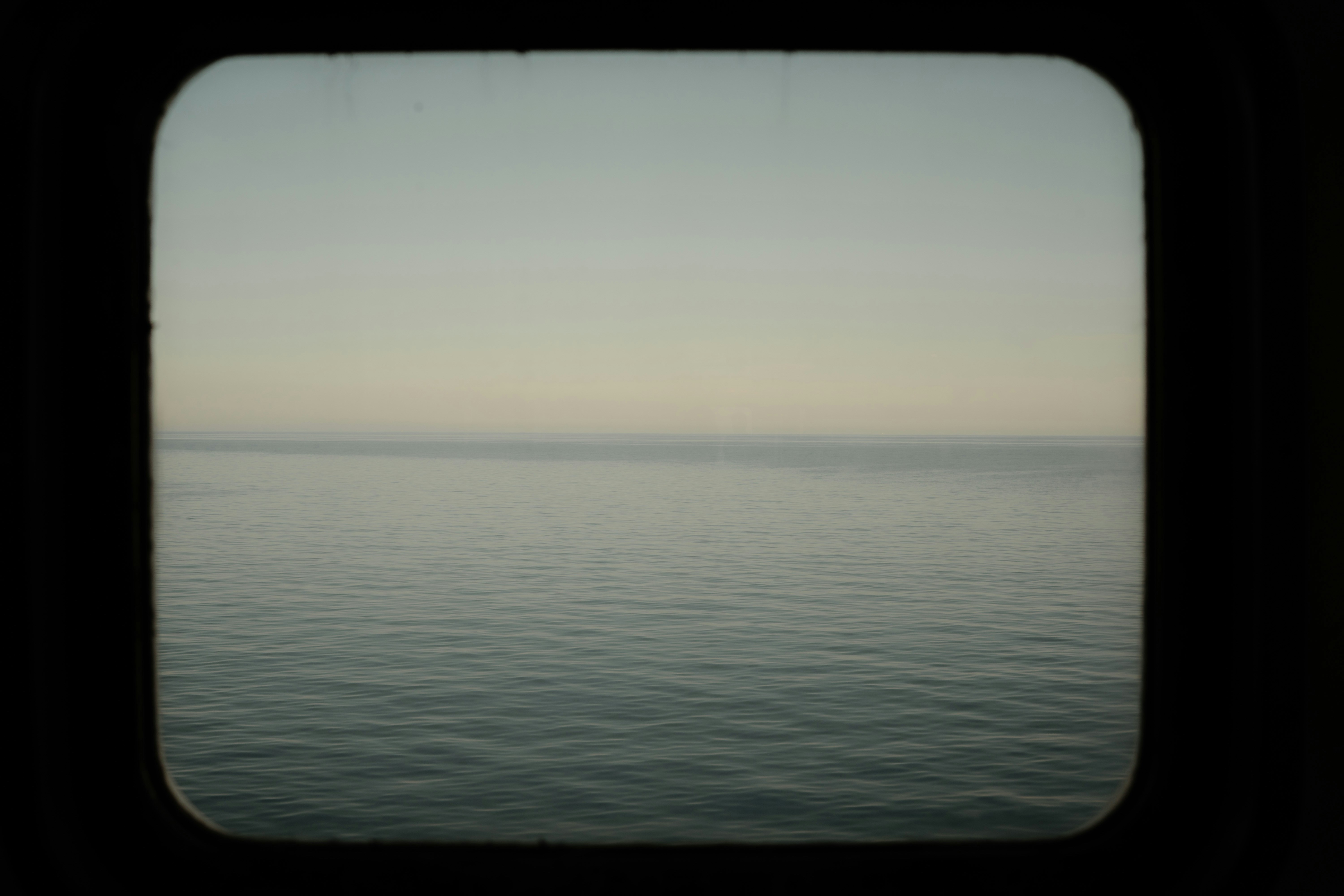 Horizon Quiet: A Seawide View Through a Round Window