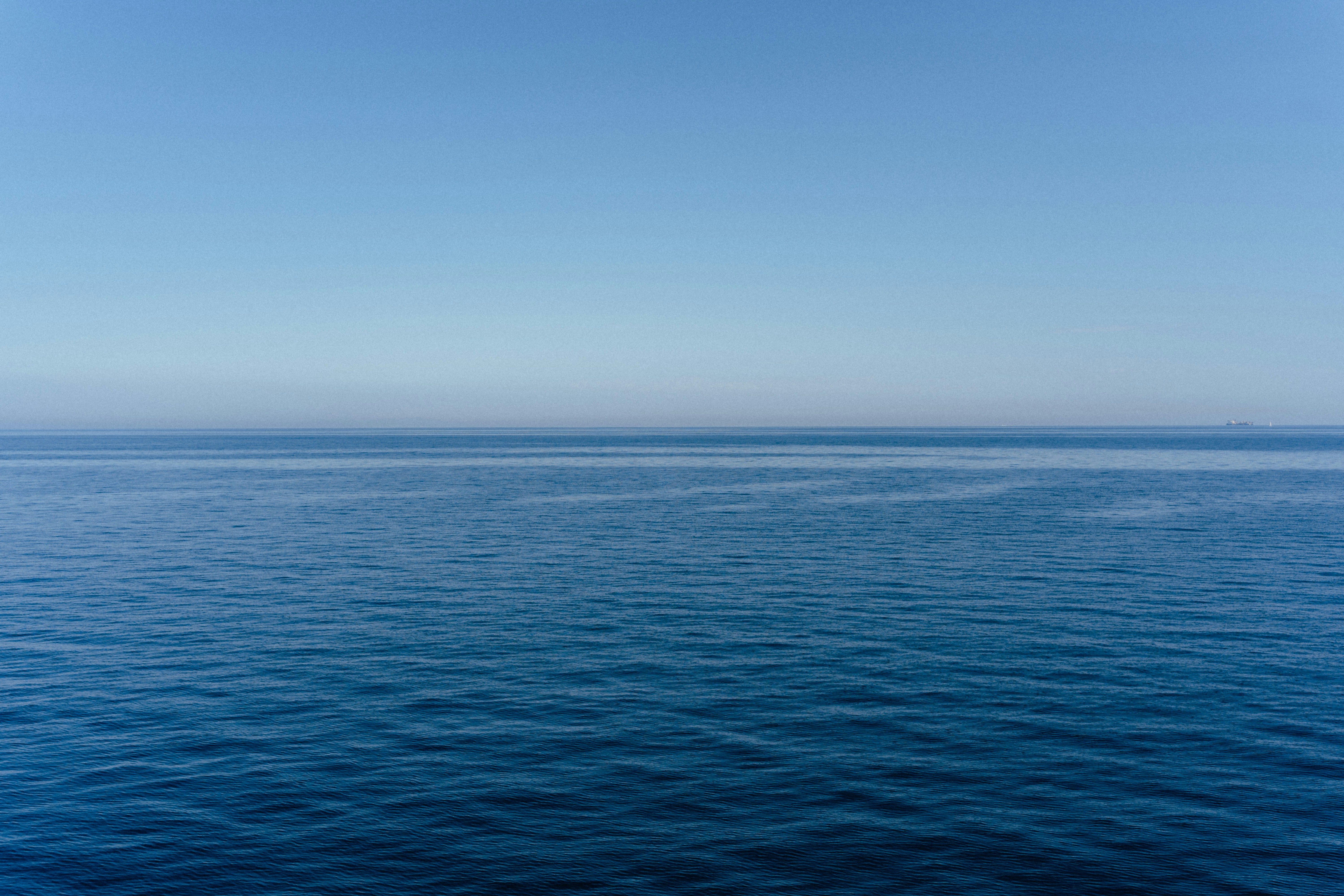 Horizon Line Over Ocean: Calm Blue Vastness