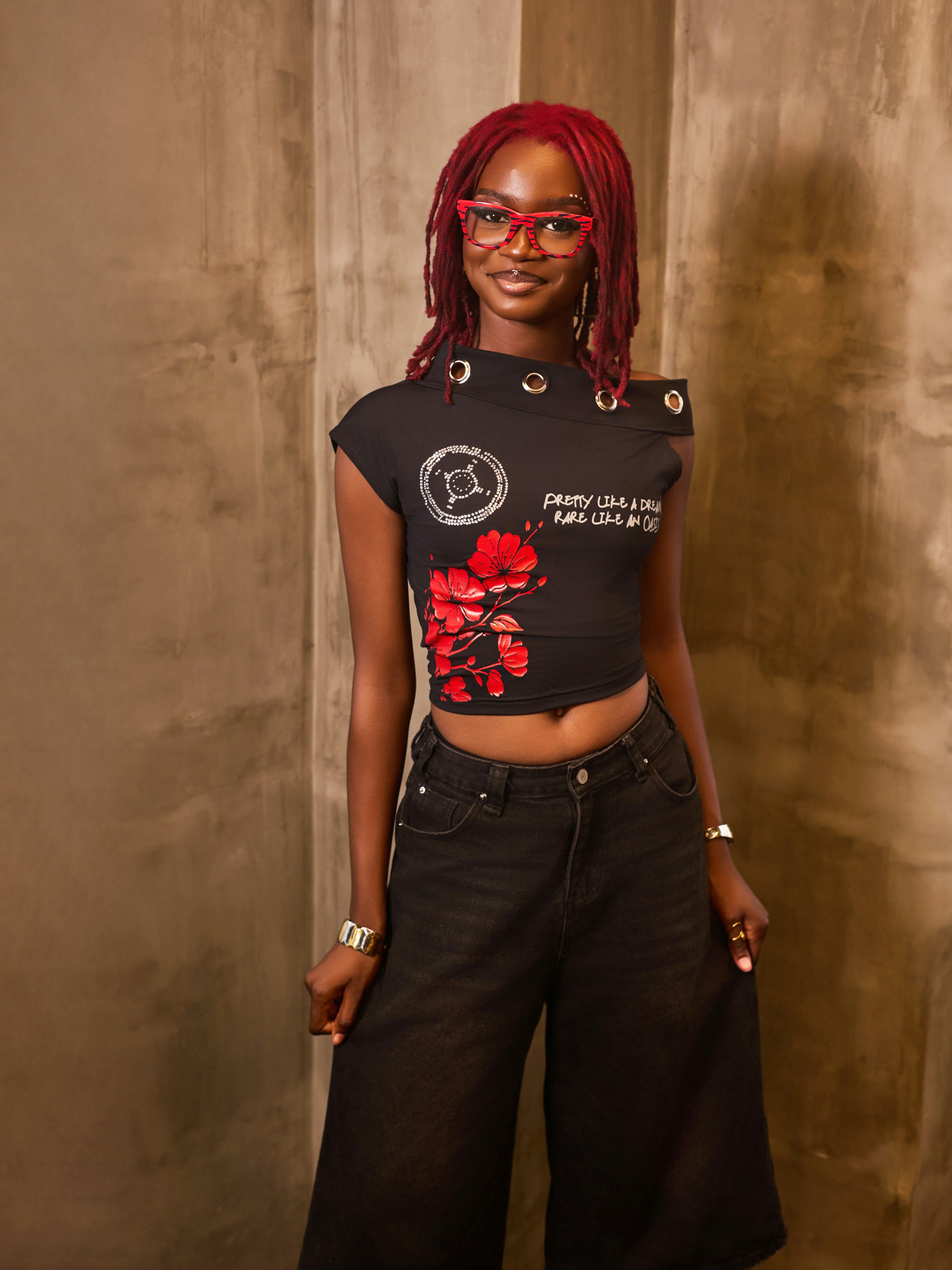 Red-Glinted Confidence: A Bold Portrait in Neon Dreads
