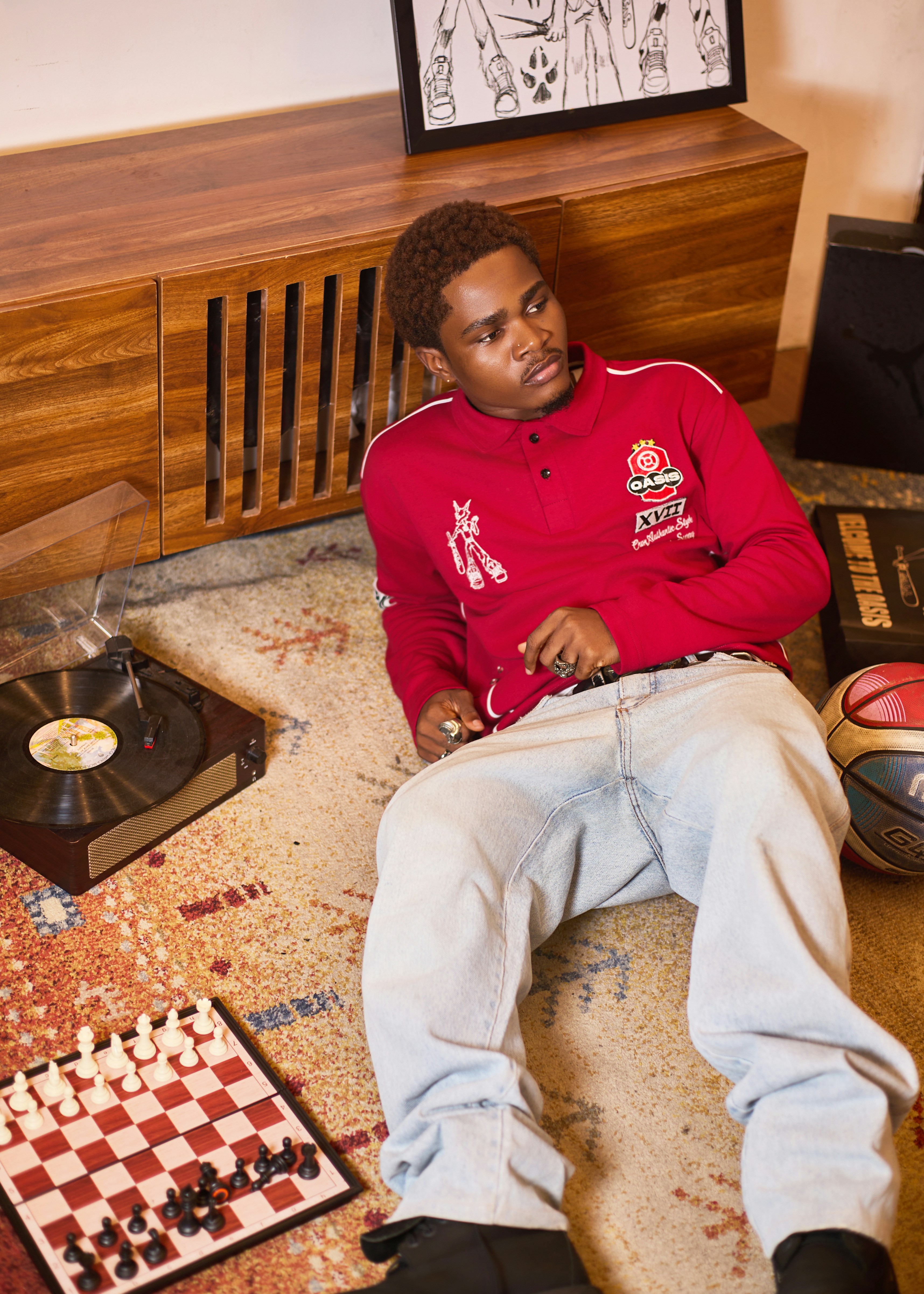 Red Polo Reverie: A Quiet Moment Amid Vinyl and Chess