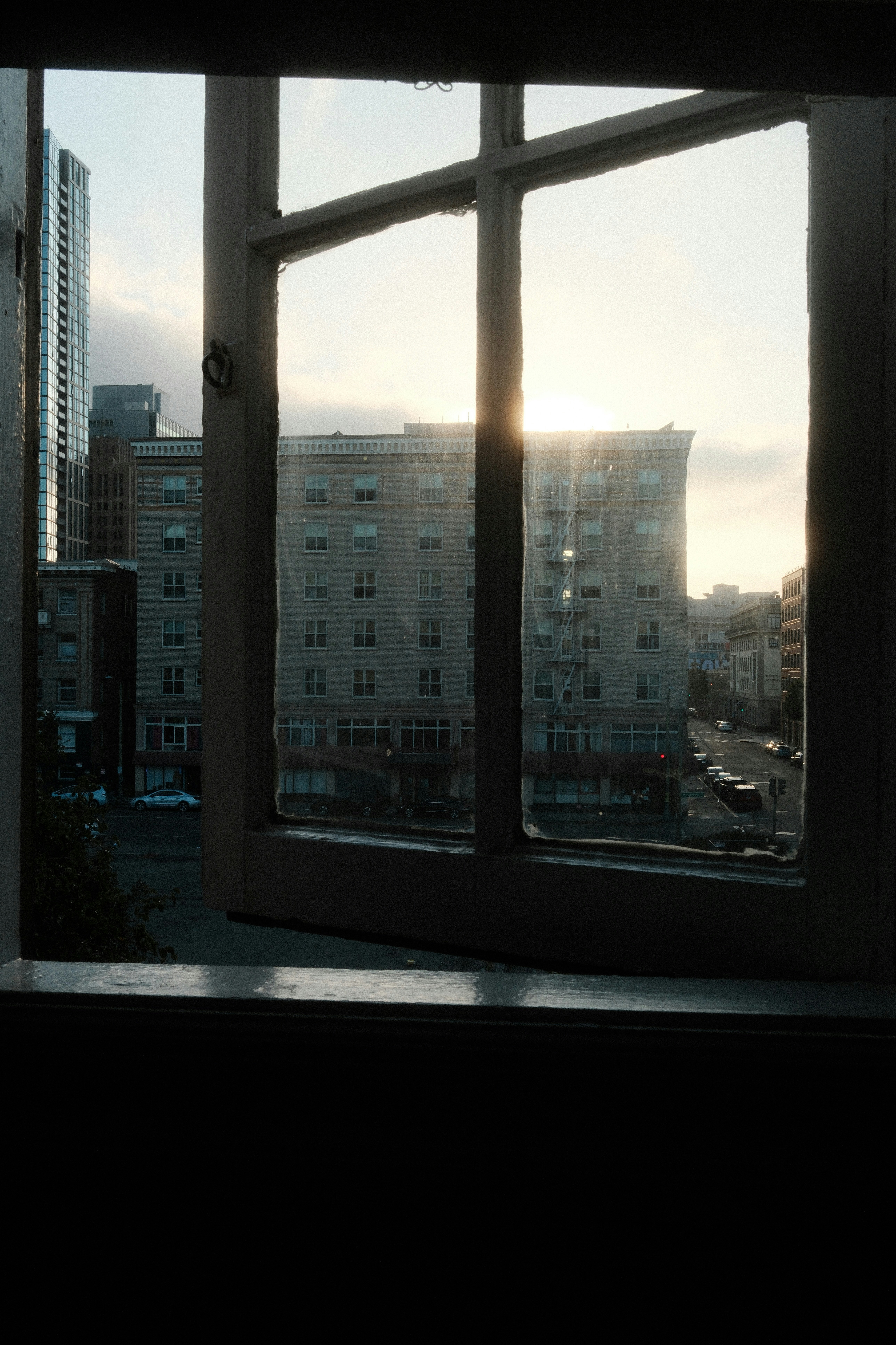 Sunlit City Through Framed Windows
