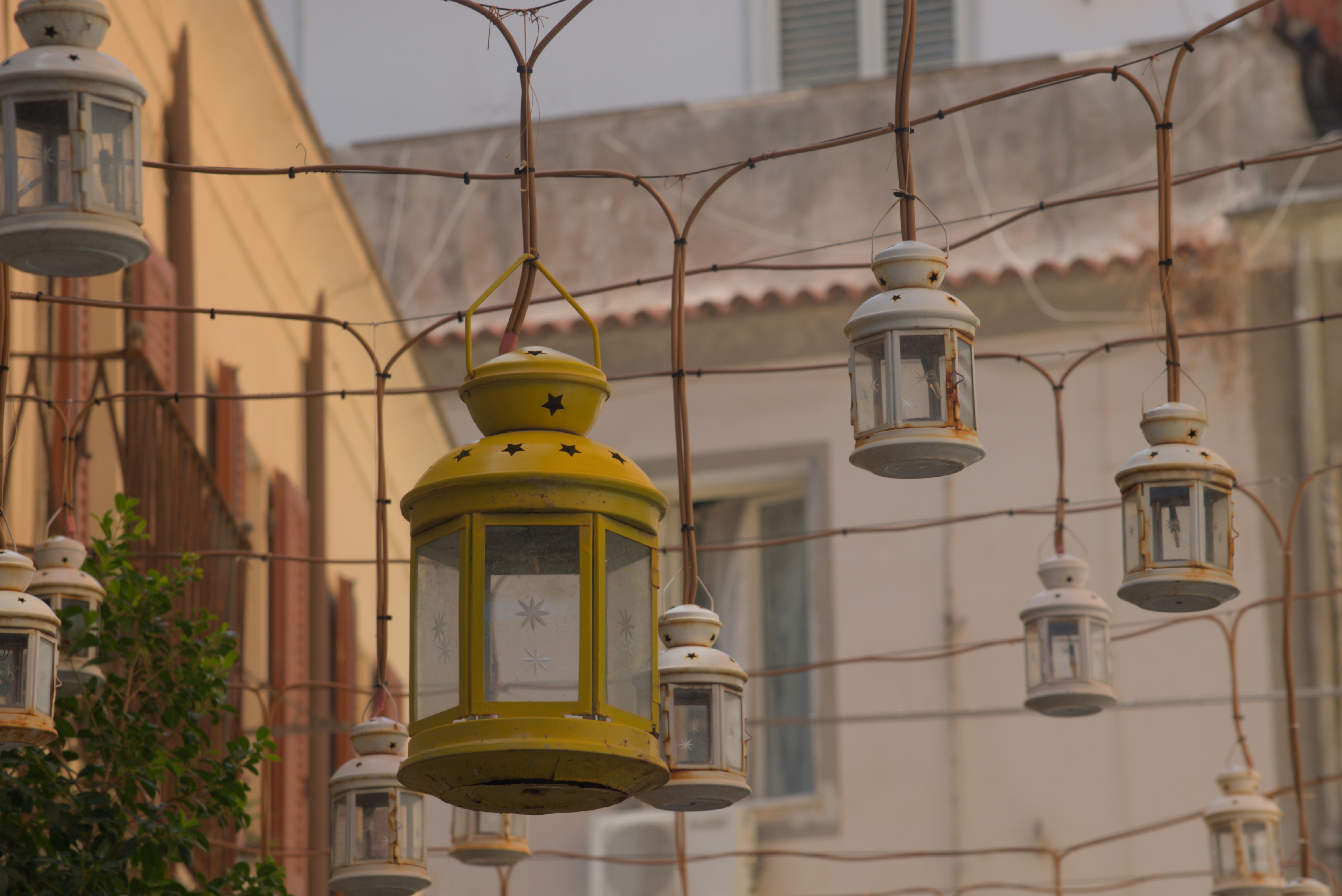 Yellow Lantern Among Moonlit Hangers