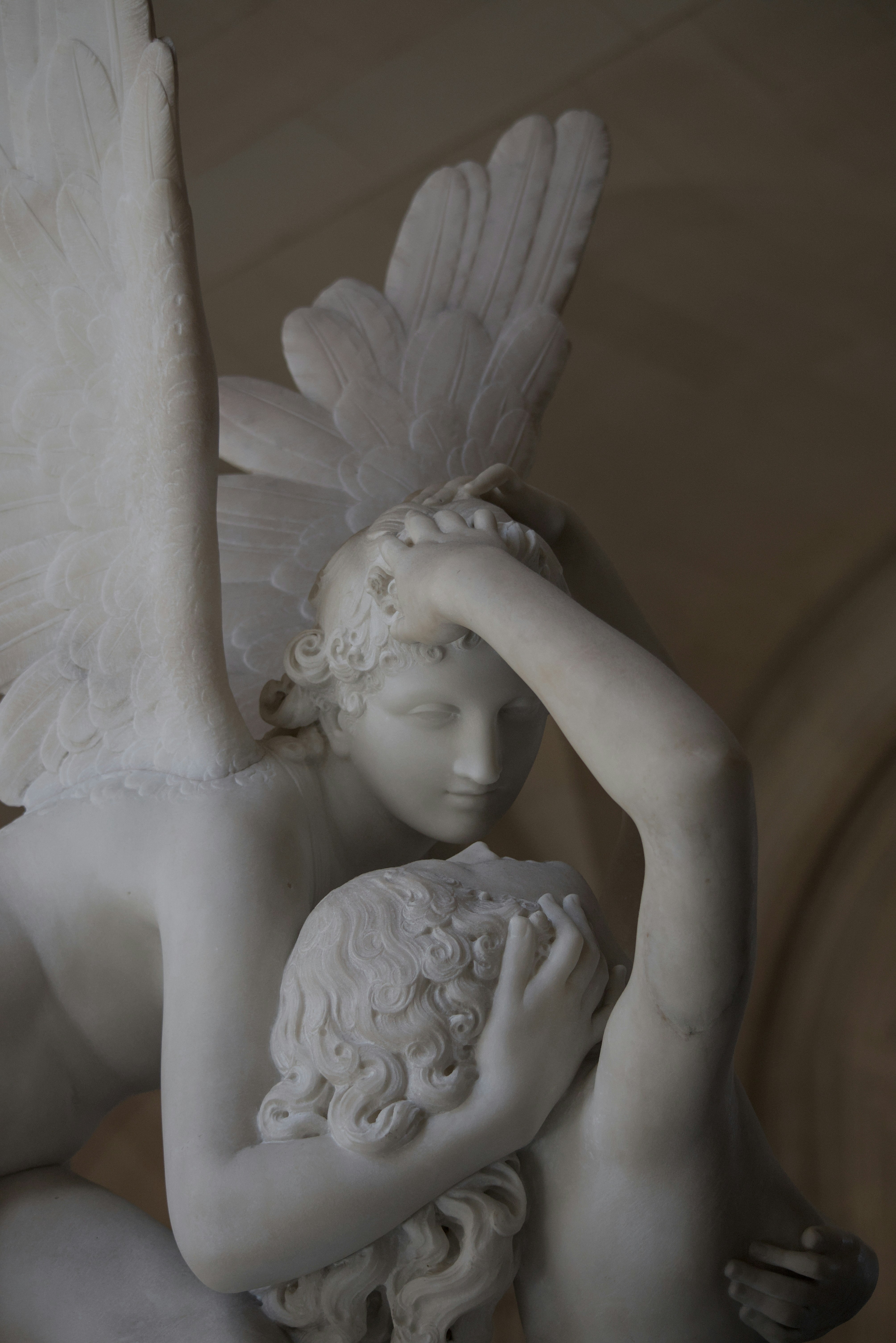 Whispered Comfort: An Angel Guarding a Quiet Embrace