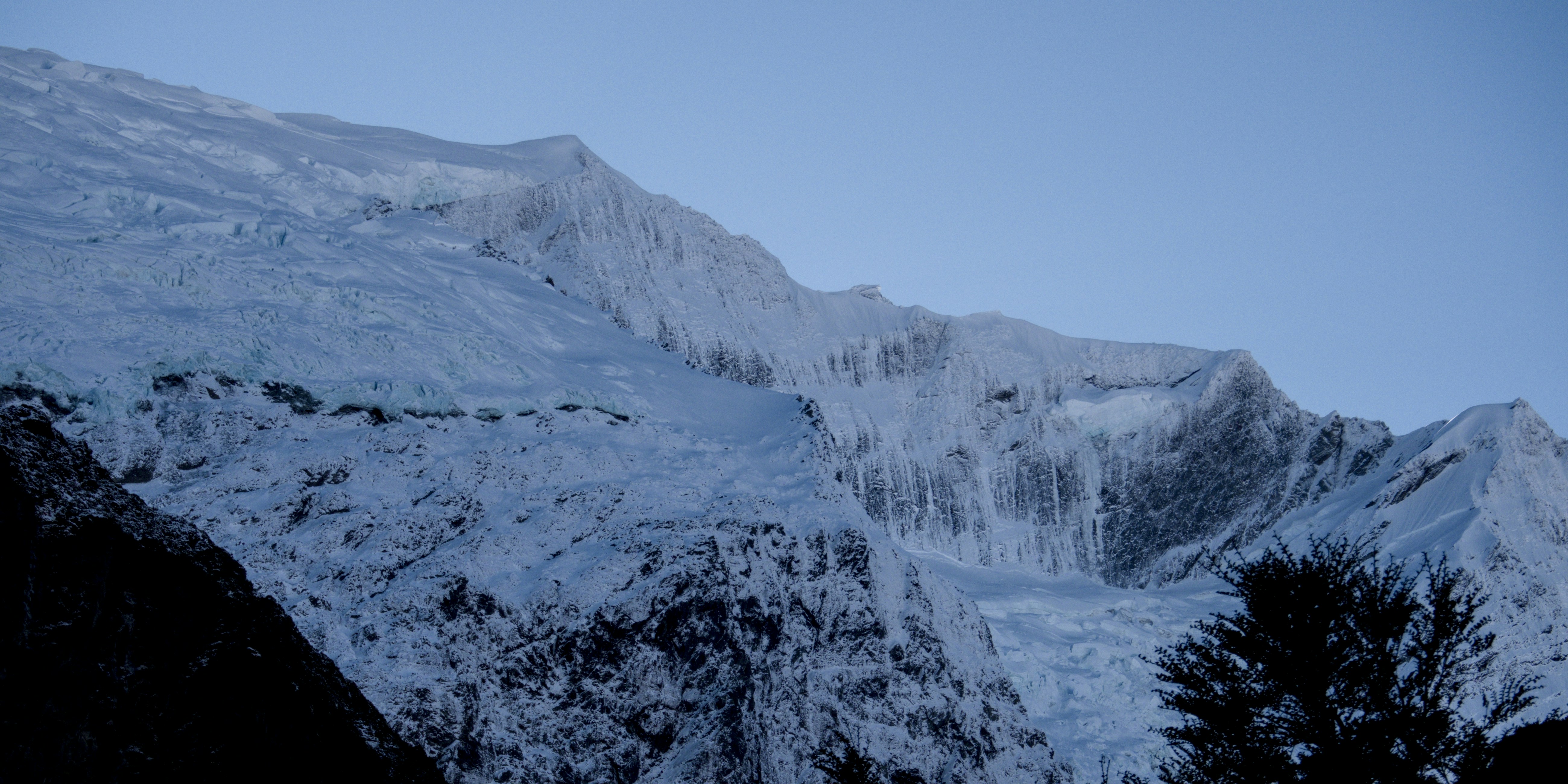 Snowbound Ridge Under a Clear Winter Sky