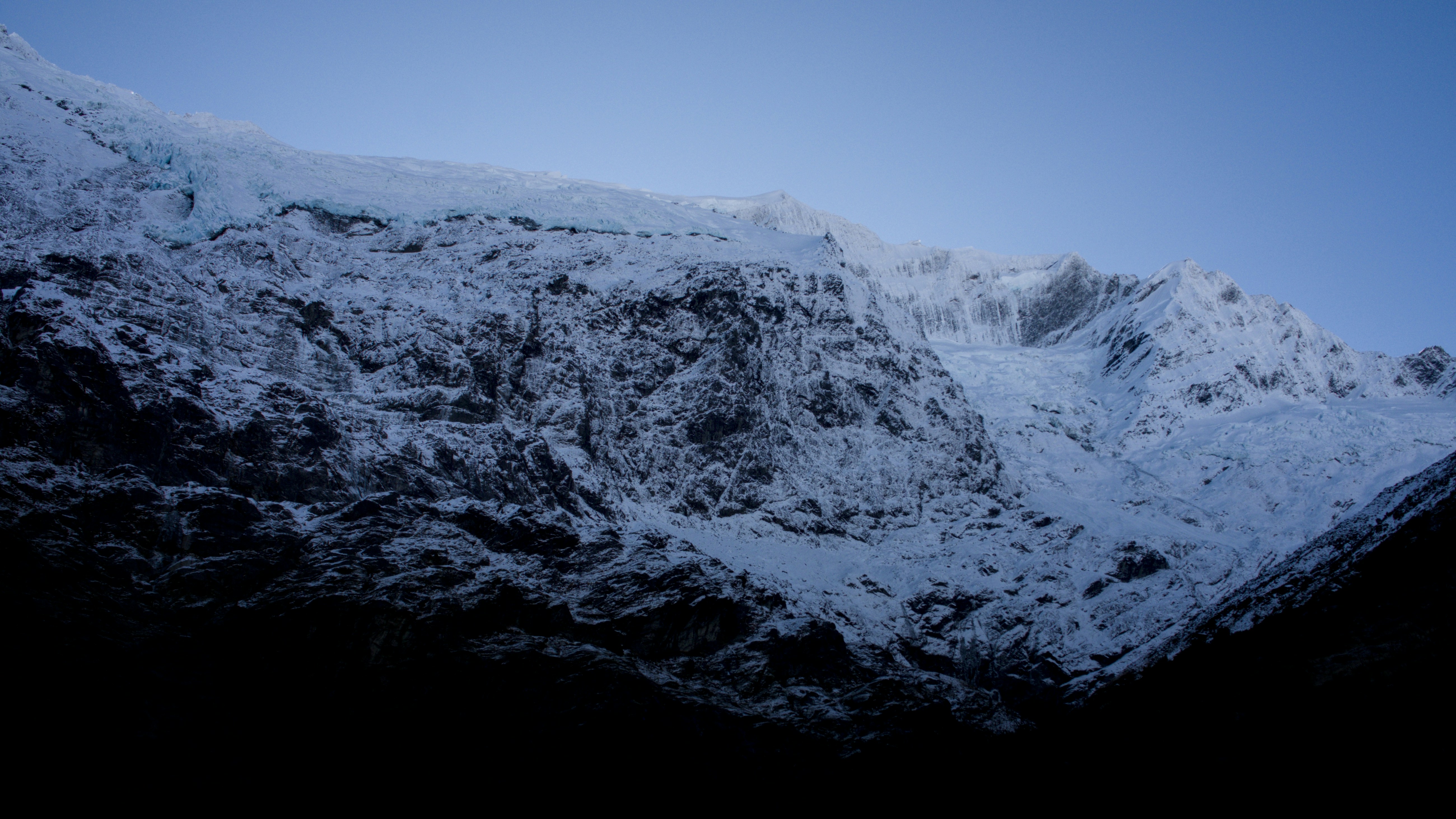 Snowbound Crest: A Quiet Ridge under an Arctic Sky