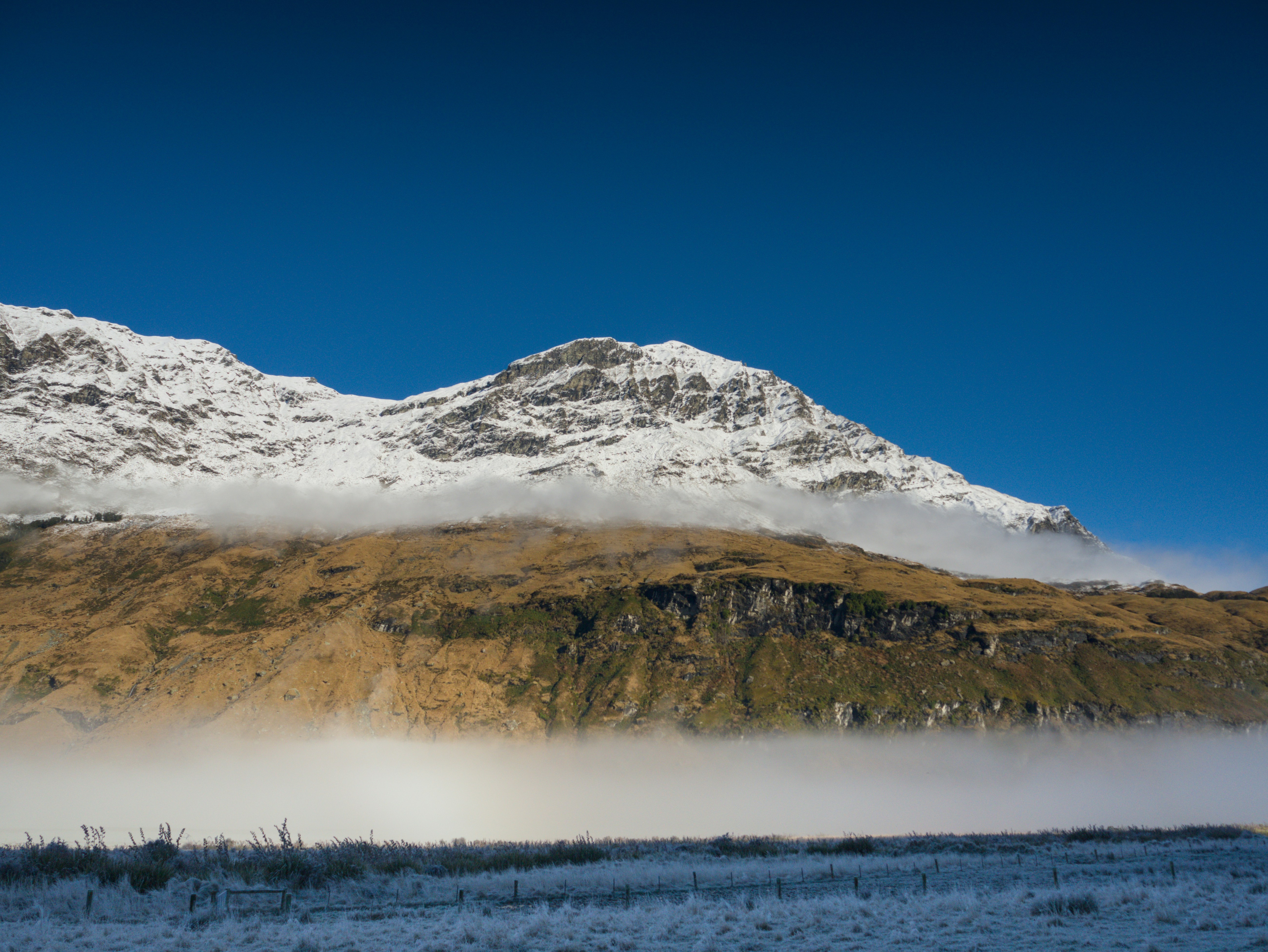 Snow-capped Peak Splitting the Mist
