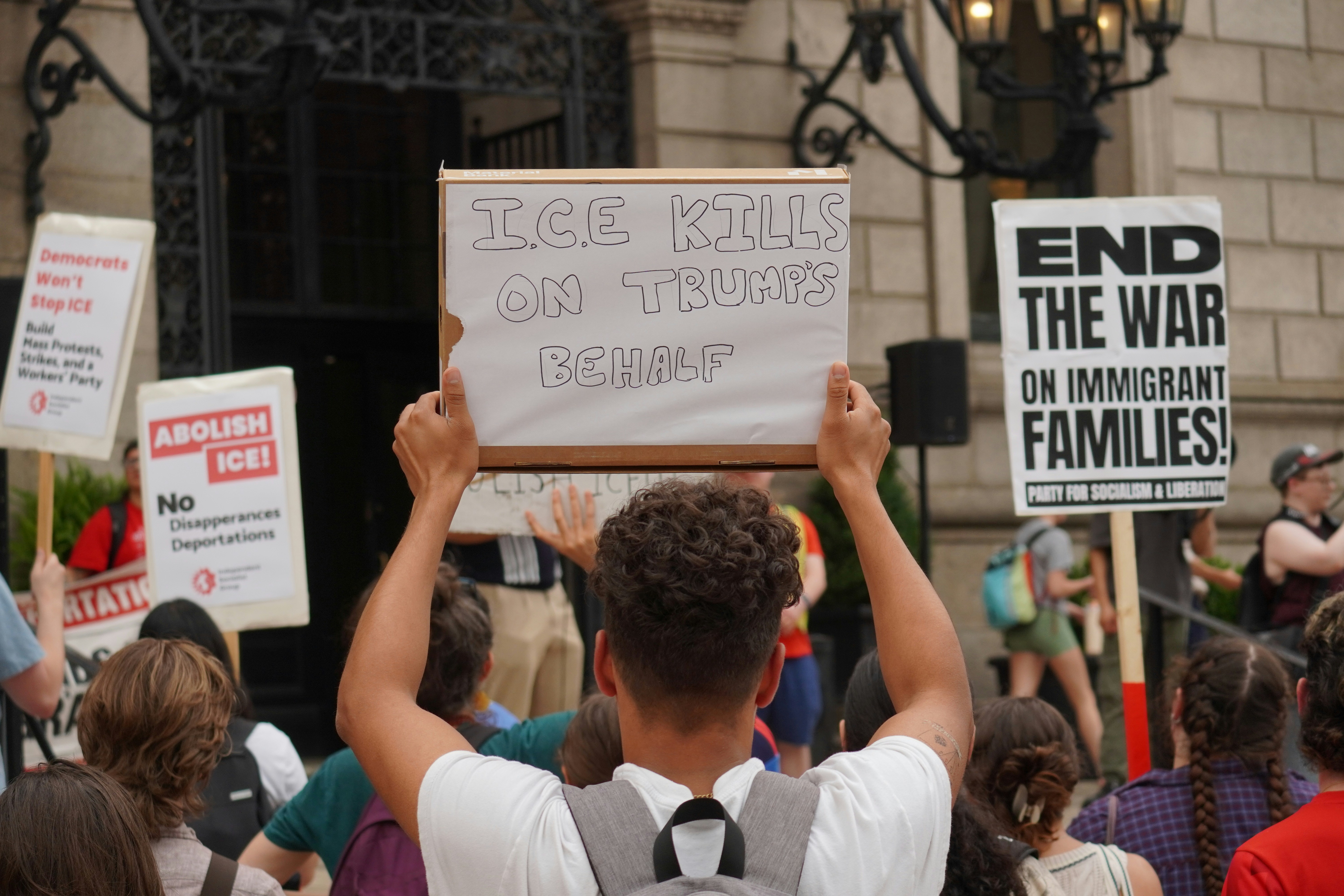 Signs of a Moment: Voices Raised at the City Hall Doorstep