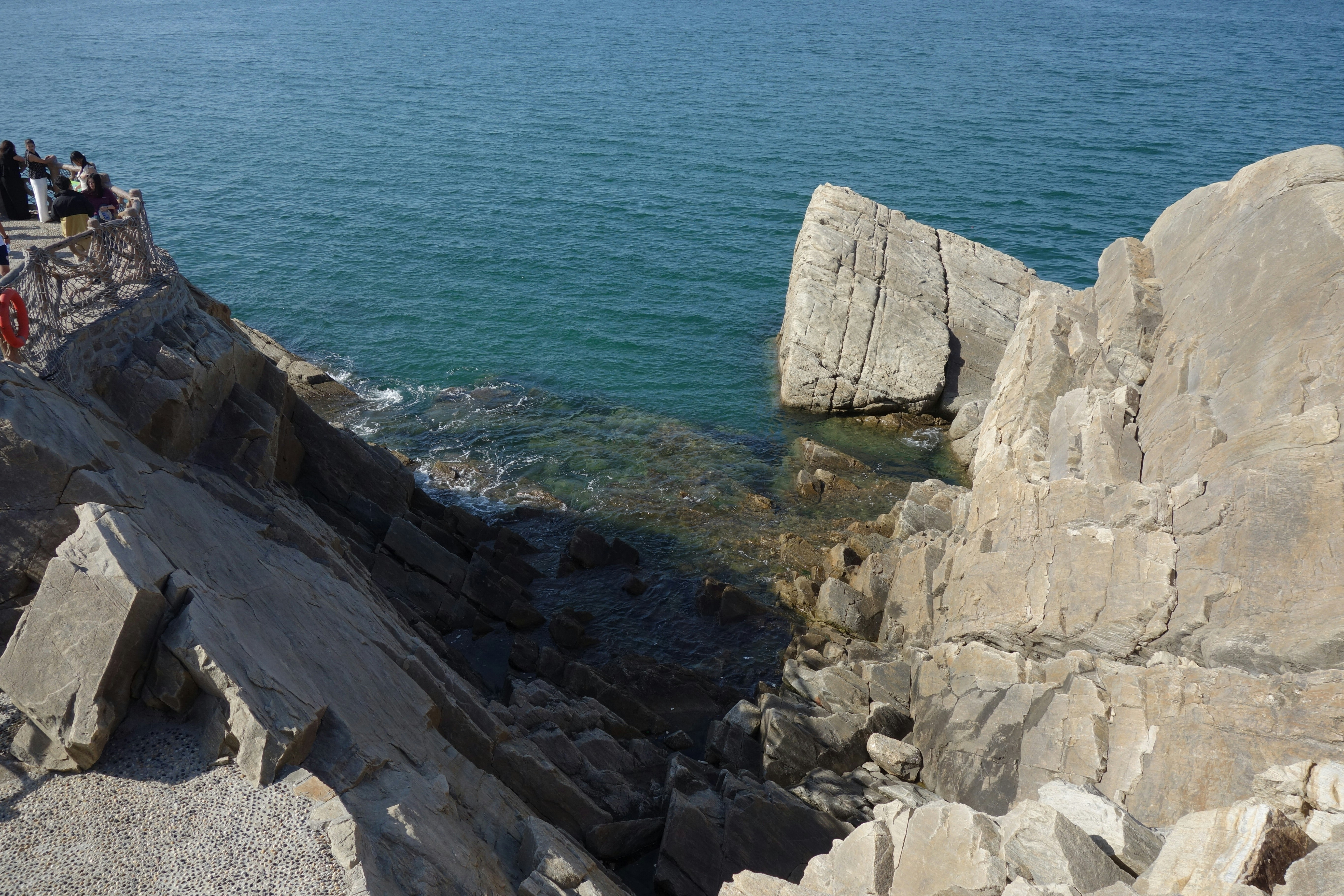 Rugged Coastal Mosaic: Weathered Granite Meeting the Sea